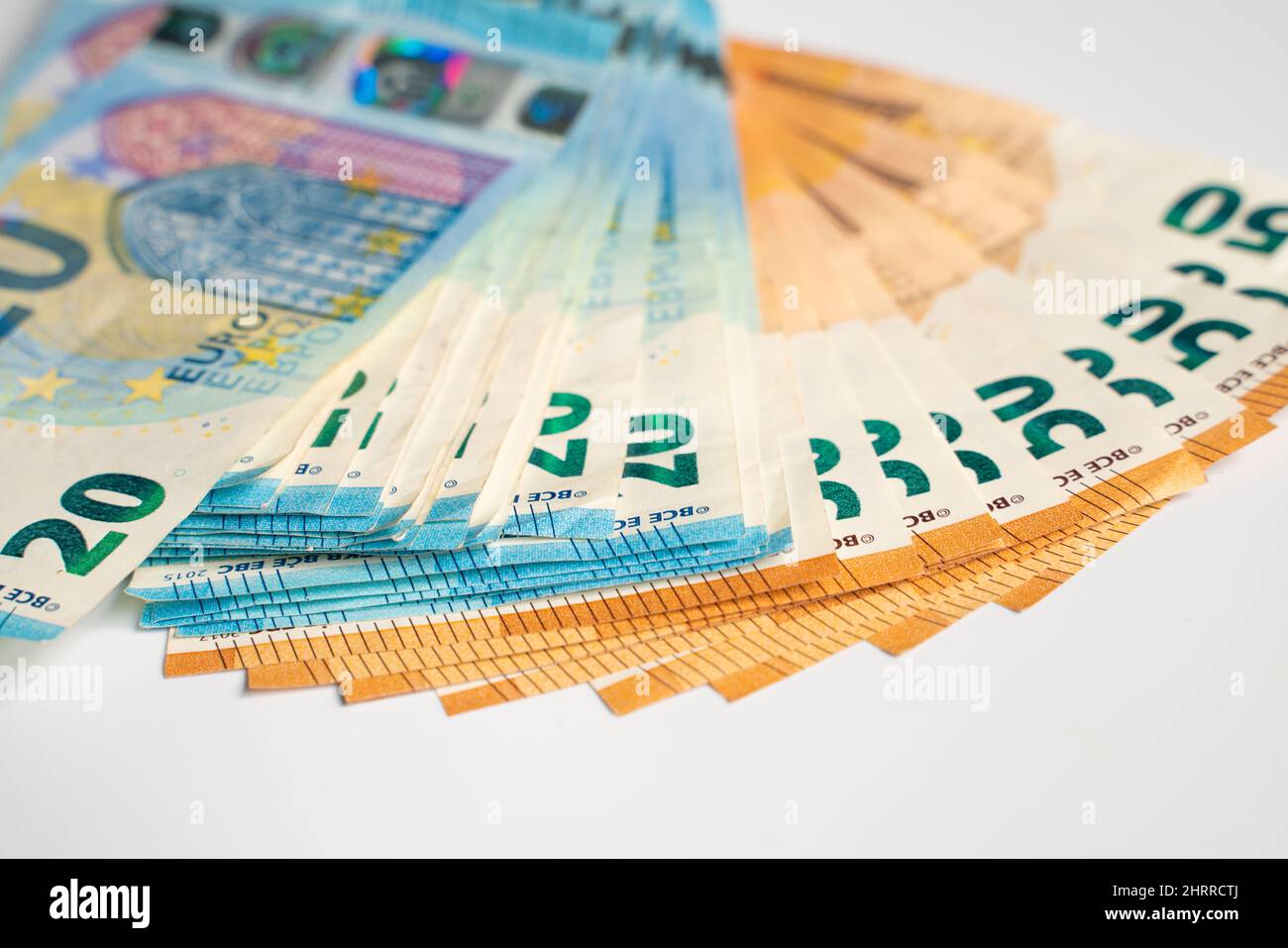 20 and 50 euro money note bill spread on white background business ...