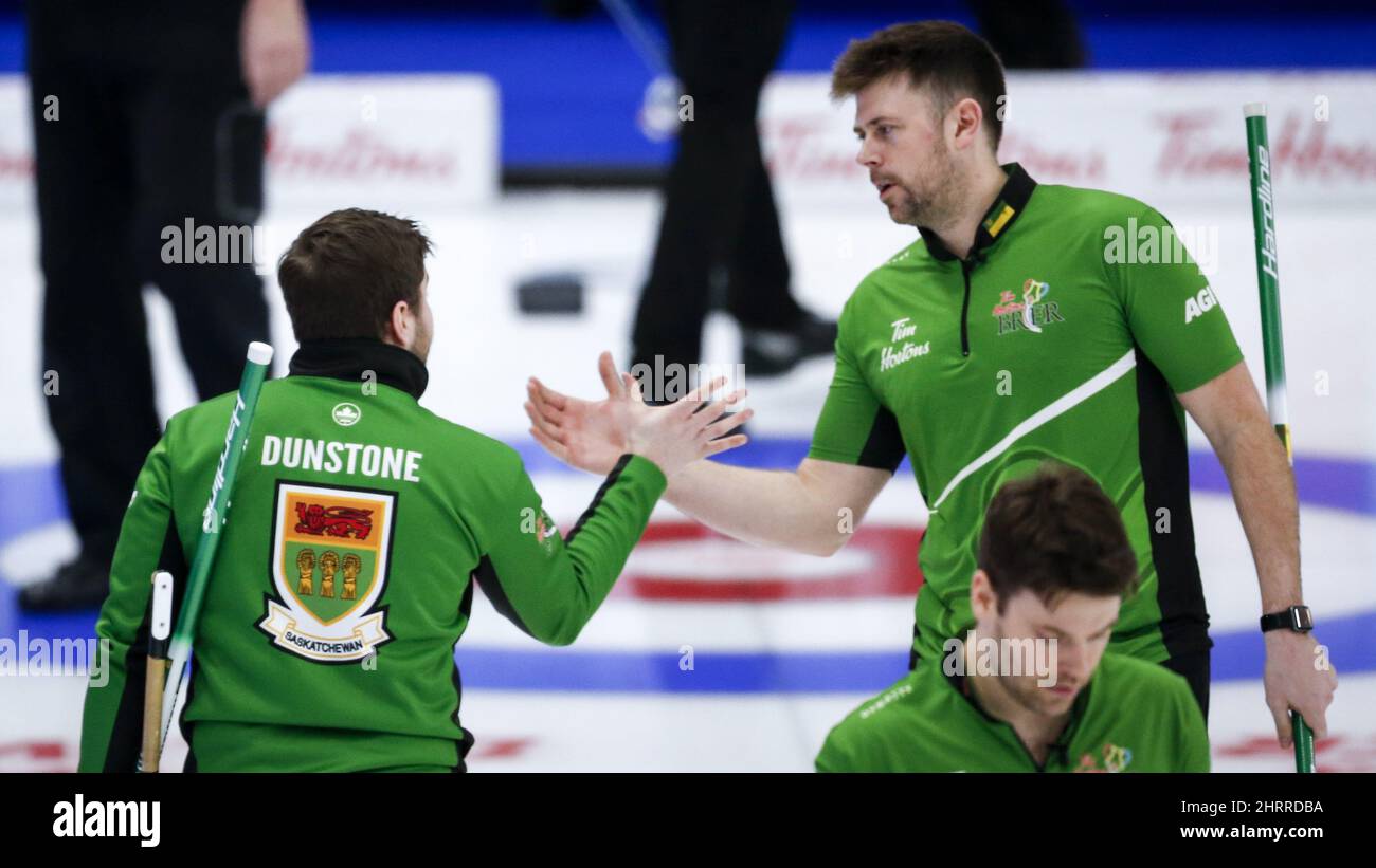 Team Saskatchewan lead Dustin Kidby, left, and third Braeden Moskowy ...