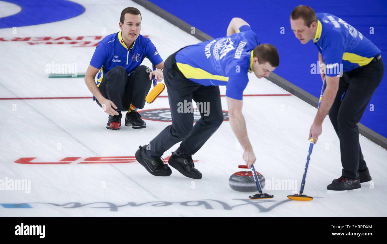 Team Alberta skip Brendan Bottcher, left, makes a shot as lead Karrick ...