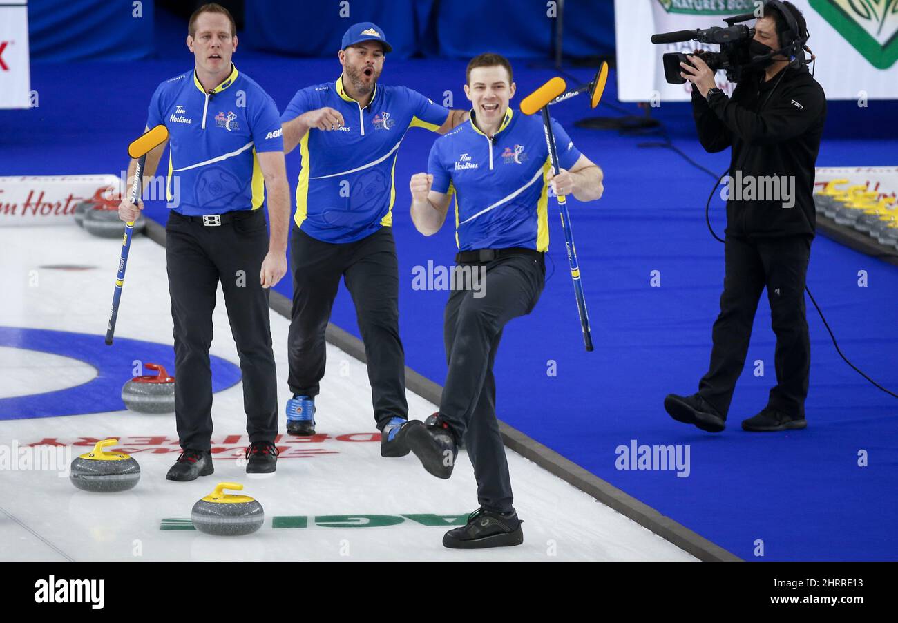 Team Alberta, left to right, lead Karrick Martin, second Brad Thiessen ...