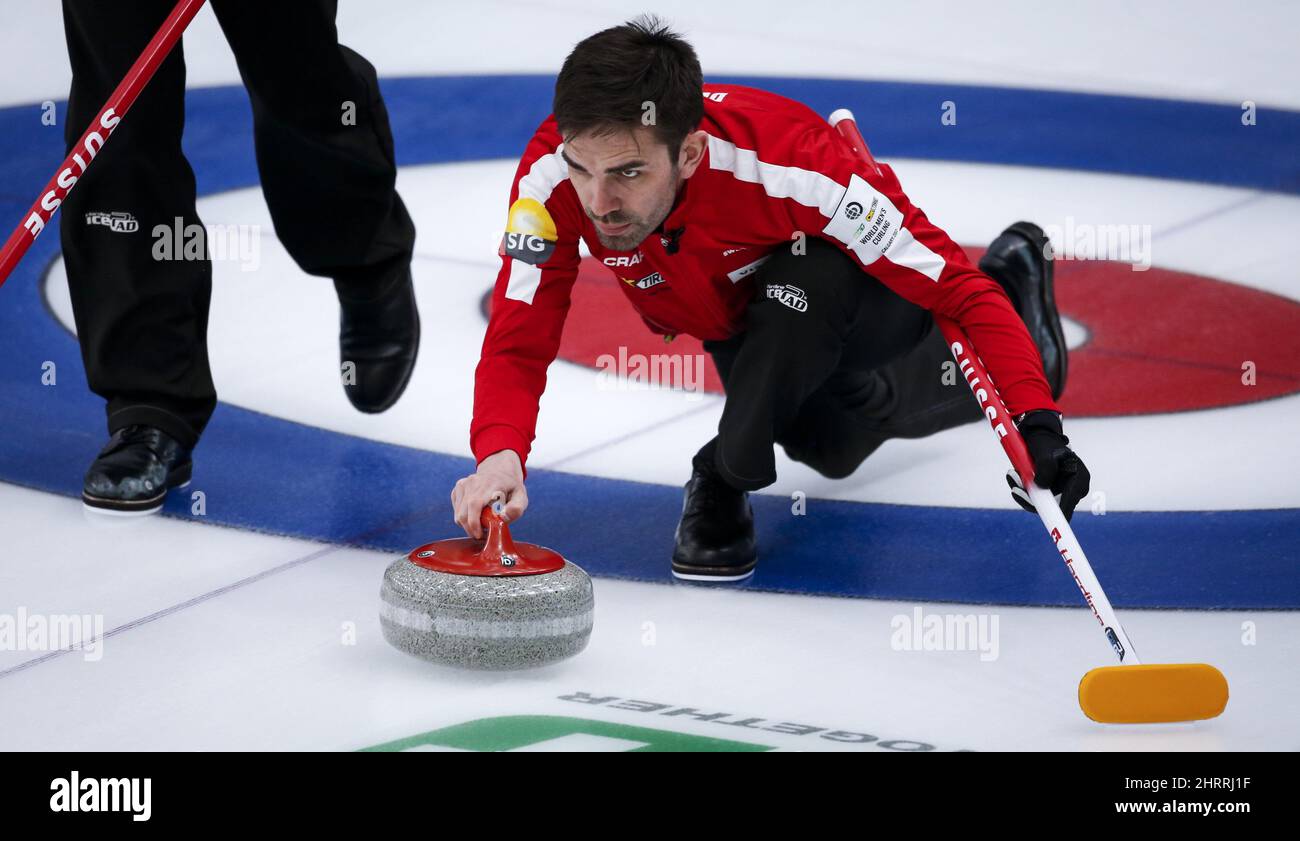 Switzerland skip Peter De Cruz makes a shot against Italy at the Men's ...