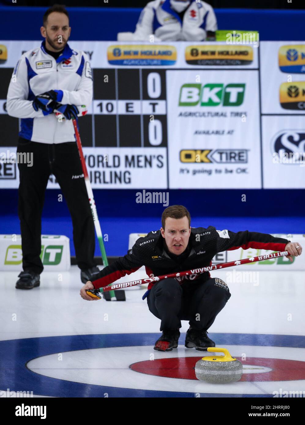 Team Canada skip Brendan Bottcher, right, directs his teammates as ...