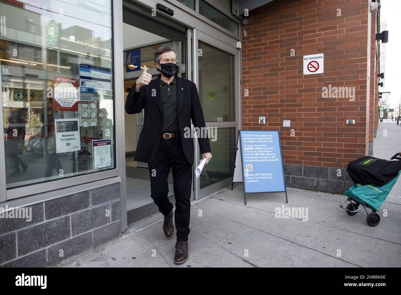 Toronto Mayor John Tory leaves a Shoppers Drug Mart after receiving a ...