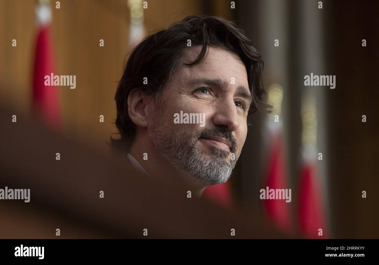Prime Minister Justin Trudeau smiles as he listens to a question during ...