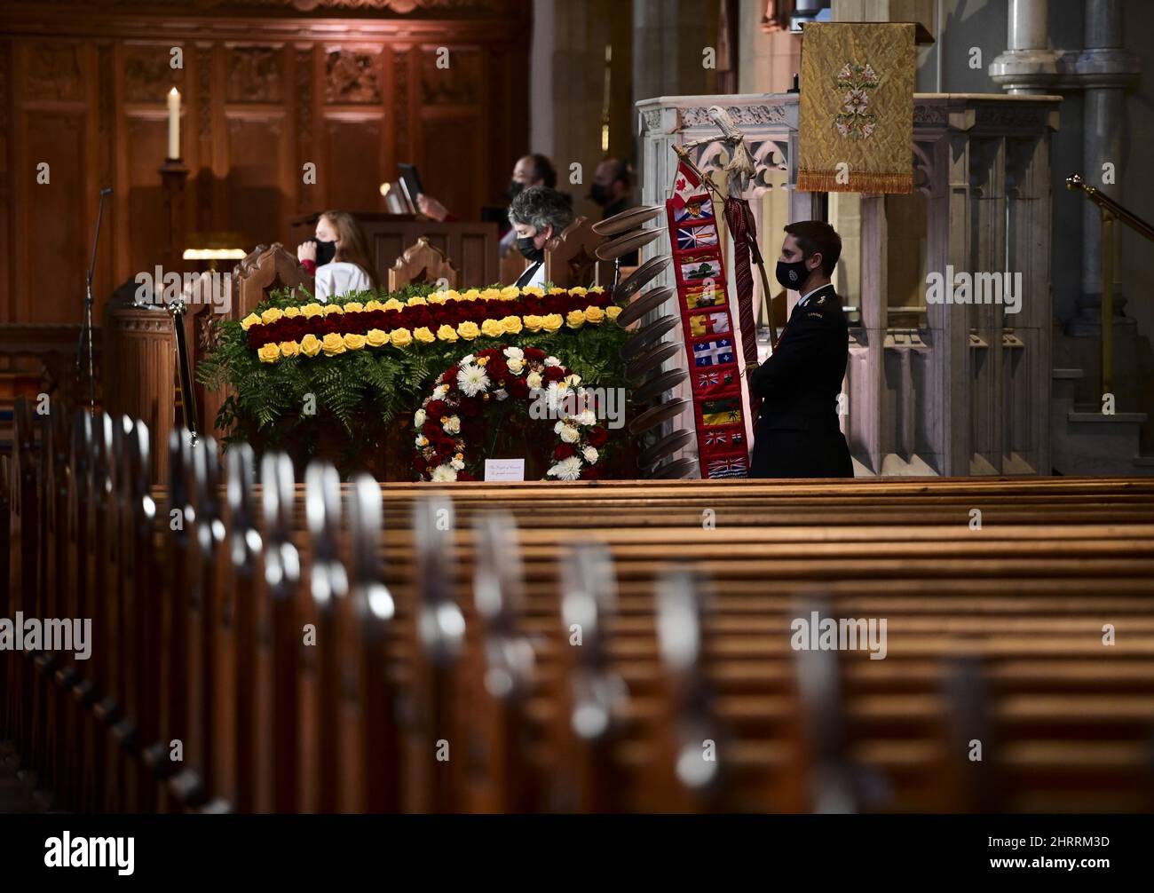 Eagle Staff Bearer stands beside a wreath on behalf of the people of ...