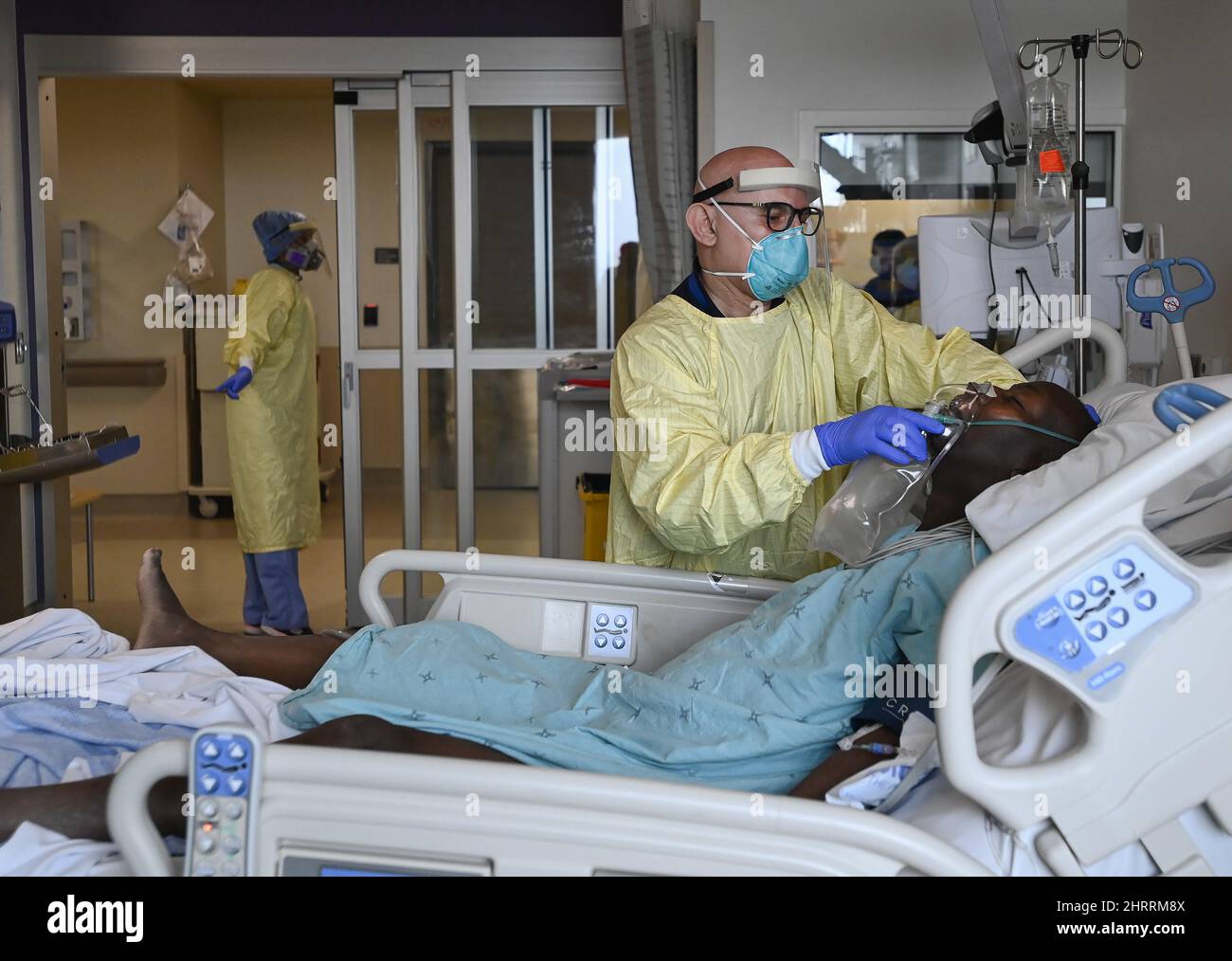 A 60 year-old COVID-19 patient fights for his life, desperately gasping ...
