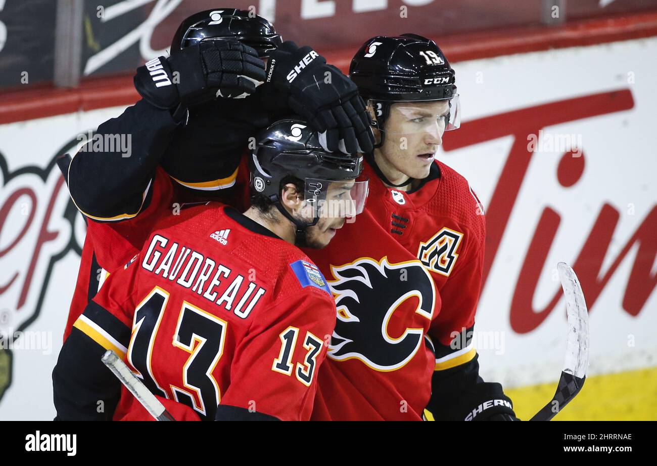 Calgary Flames' Johnny Gaudreau, left, celebrates his goal with ...
