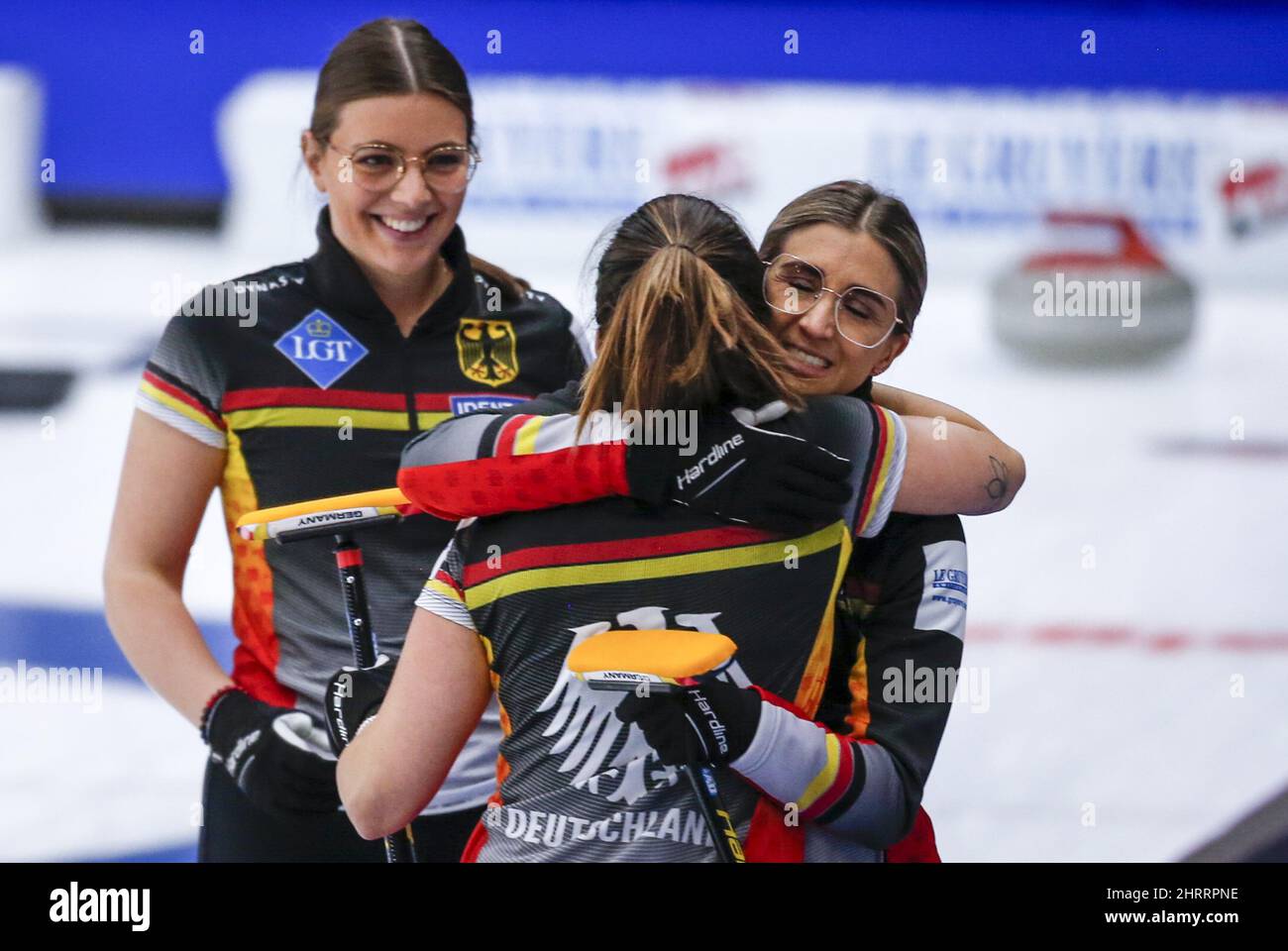 Germany skip Daniela Jentsch, right, hugs lead Analena Jentsch as third ...