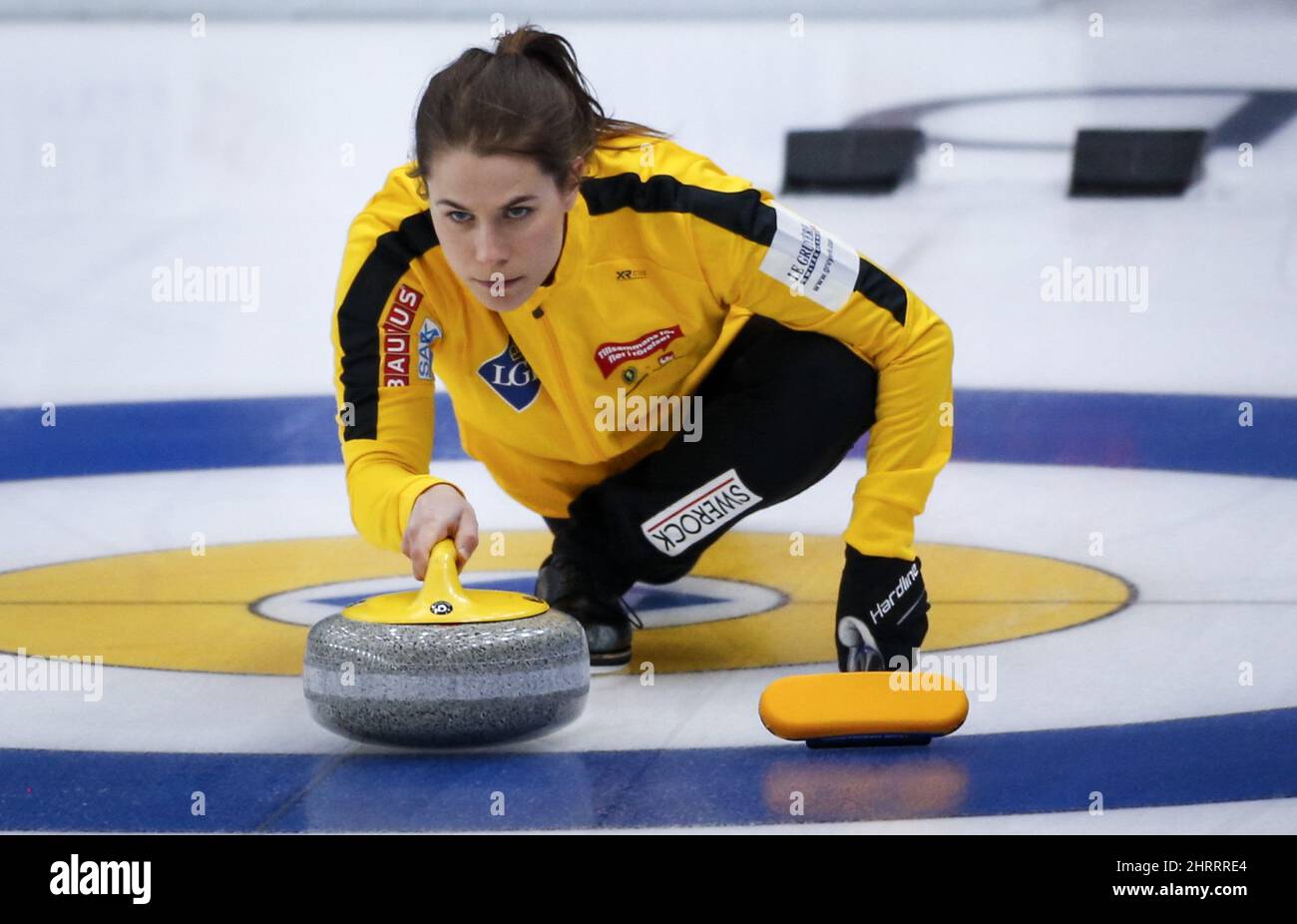 Sweden skip Anna Hasselborg makes a shot against Germany at the Women's ...