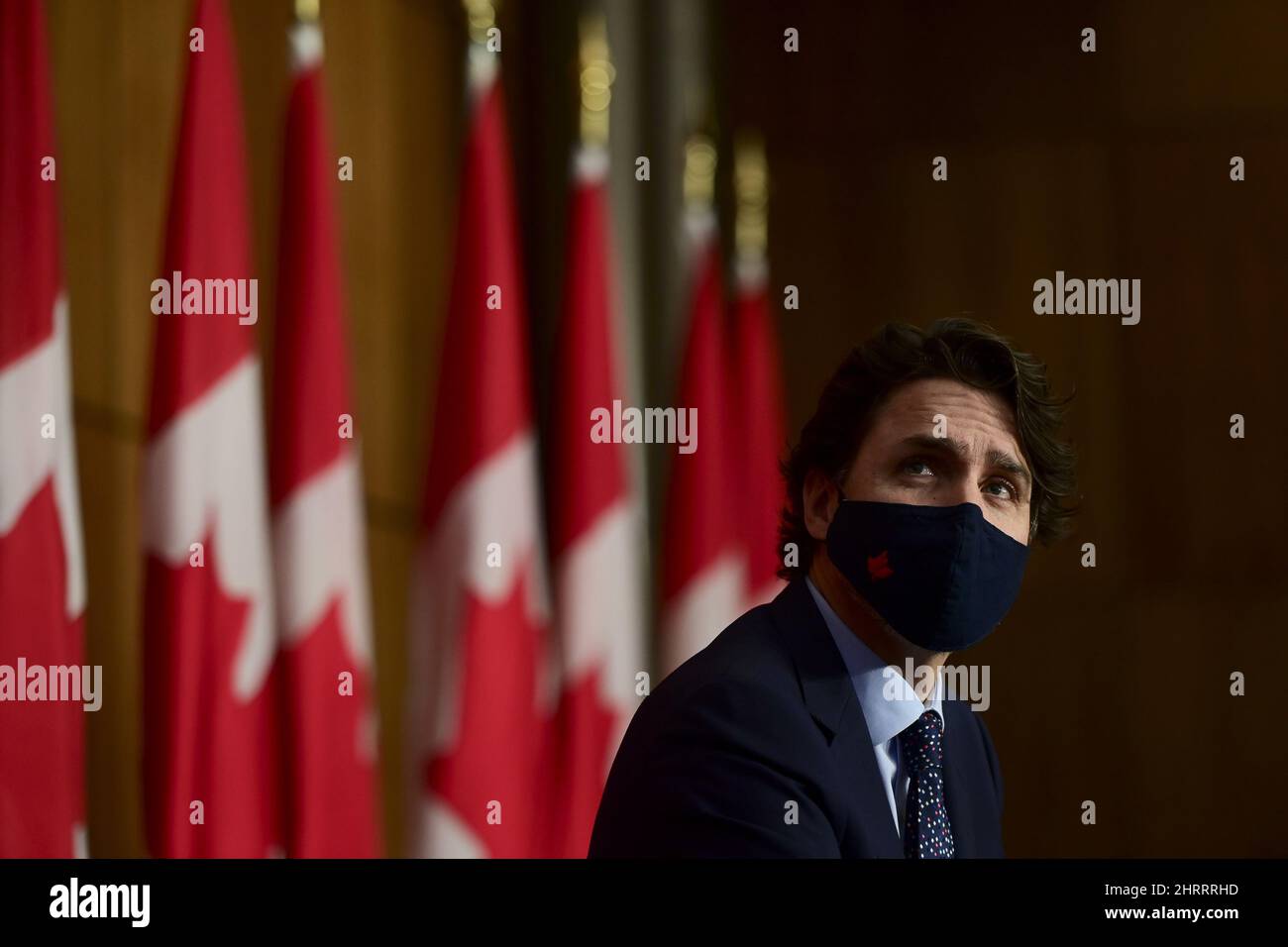 Prime Minister Justin Trudeau looks on during a press conference to ...