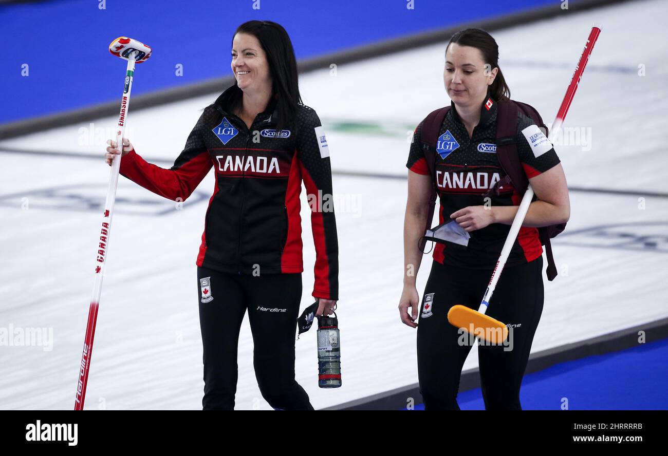 Canada skip Kerri Einarson, left, and third Val Sweeting leave the ice ...