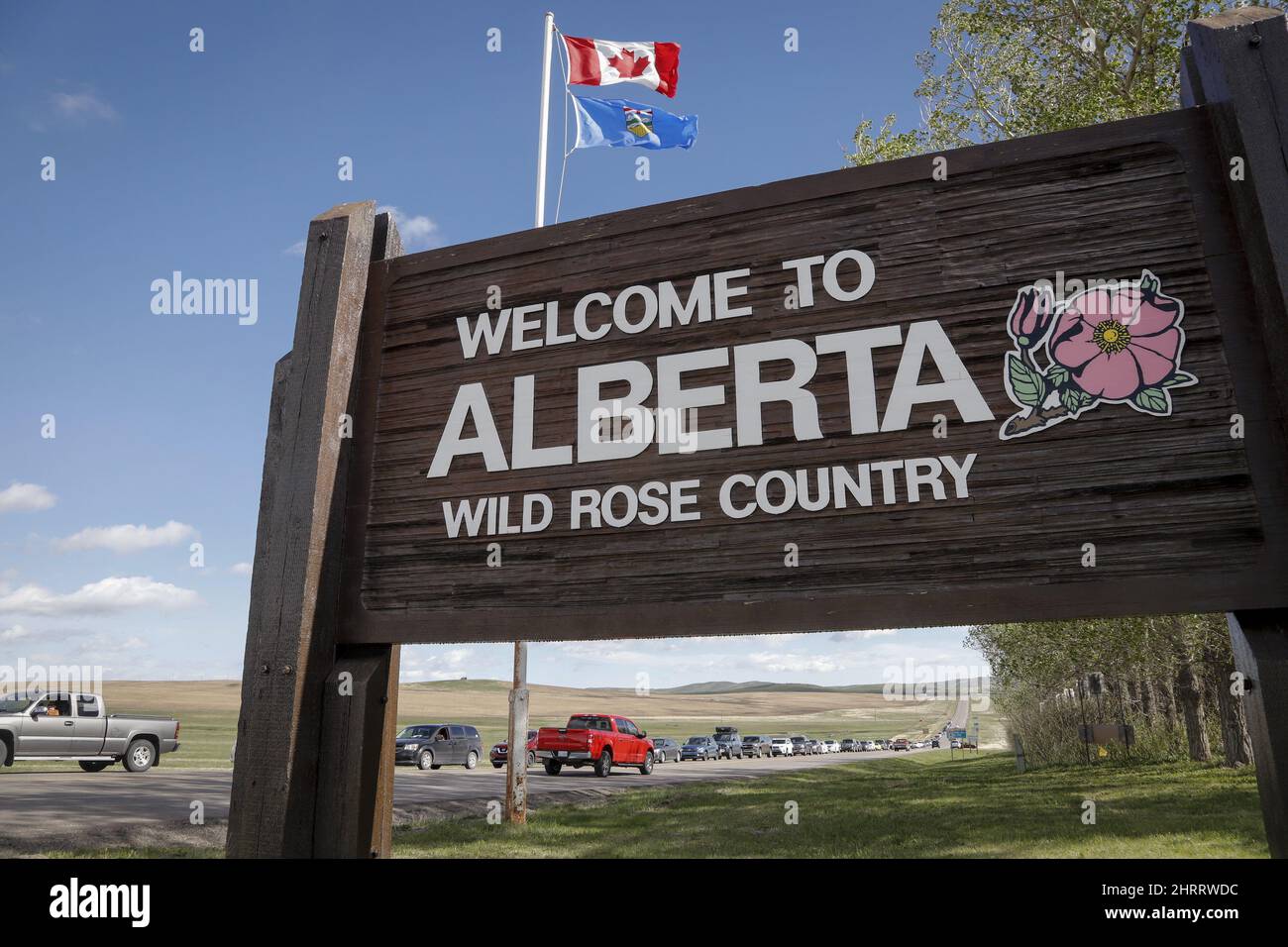 Southern Alberta residents line up to get shots of a COVID-19 vaccine ...