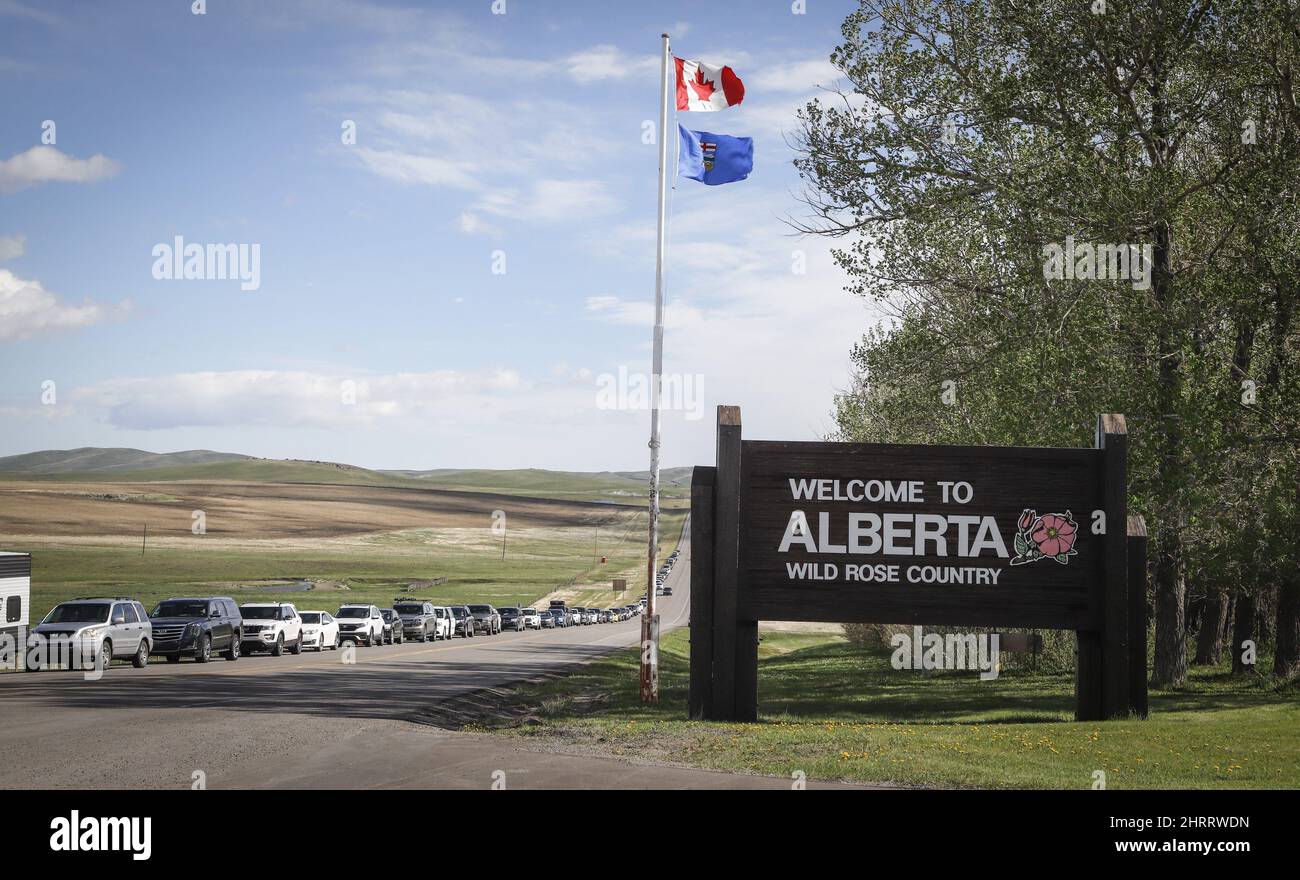 Southern Alberta residents line up to get shots of a COVID-19 vaccine ...
