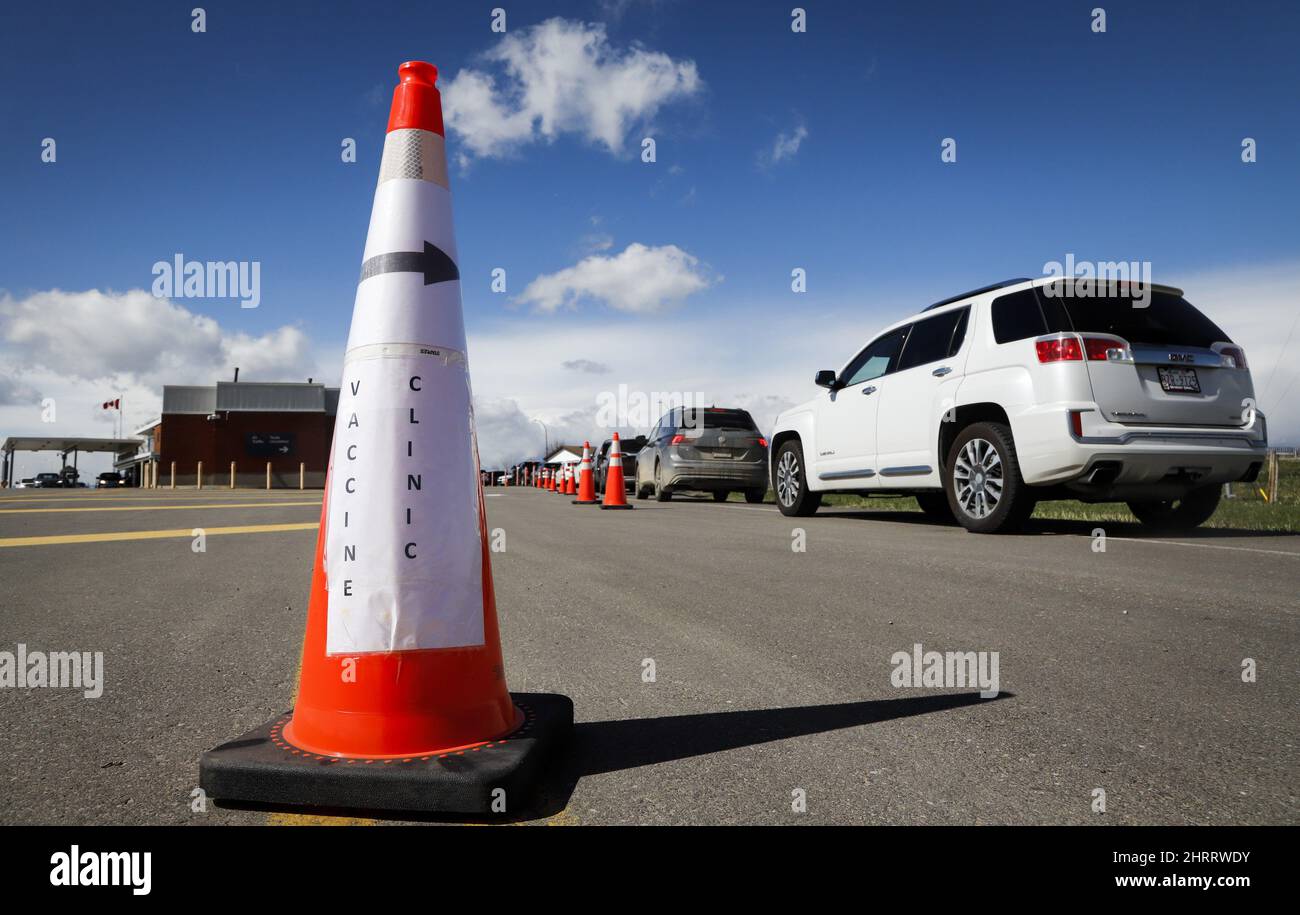 Southern Alberta residents line up to get shots of a COVID-19 vaccine ...
