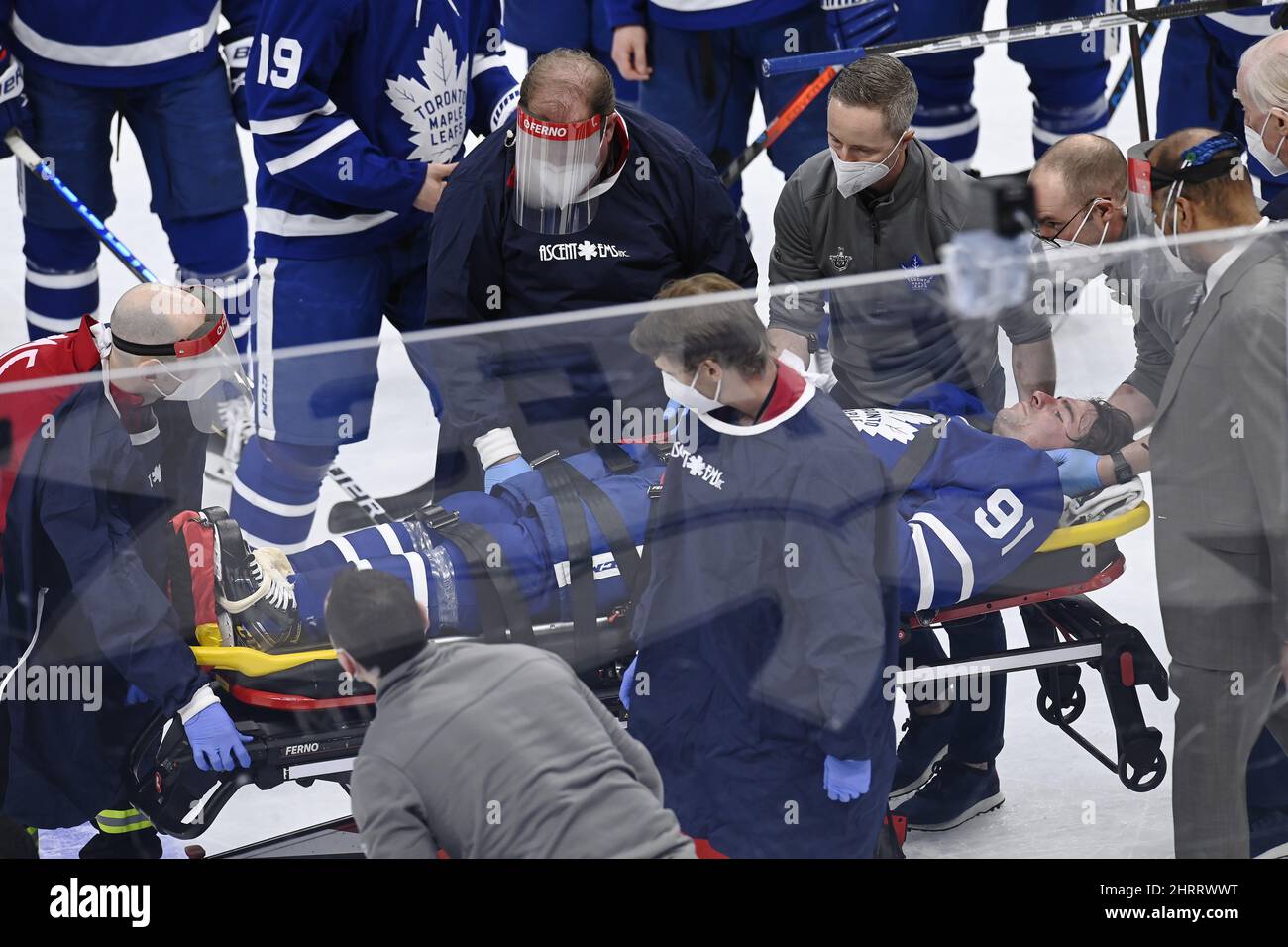 Toronto Maple Leafs forward John Tavares (91) is helped on to a ...
