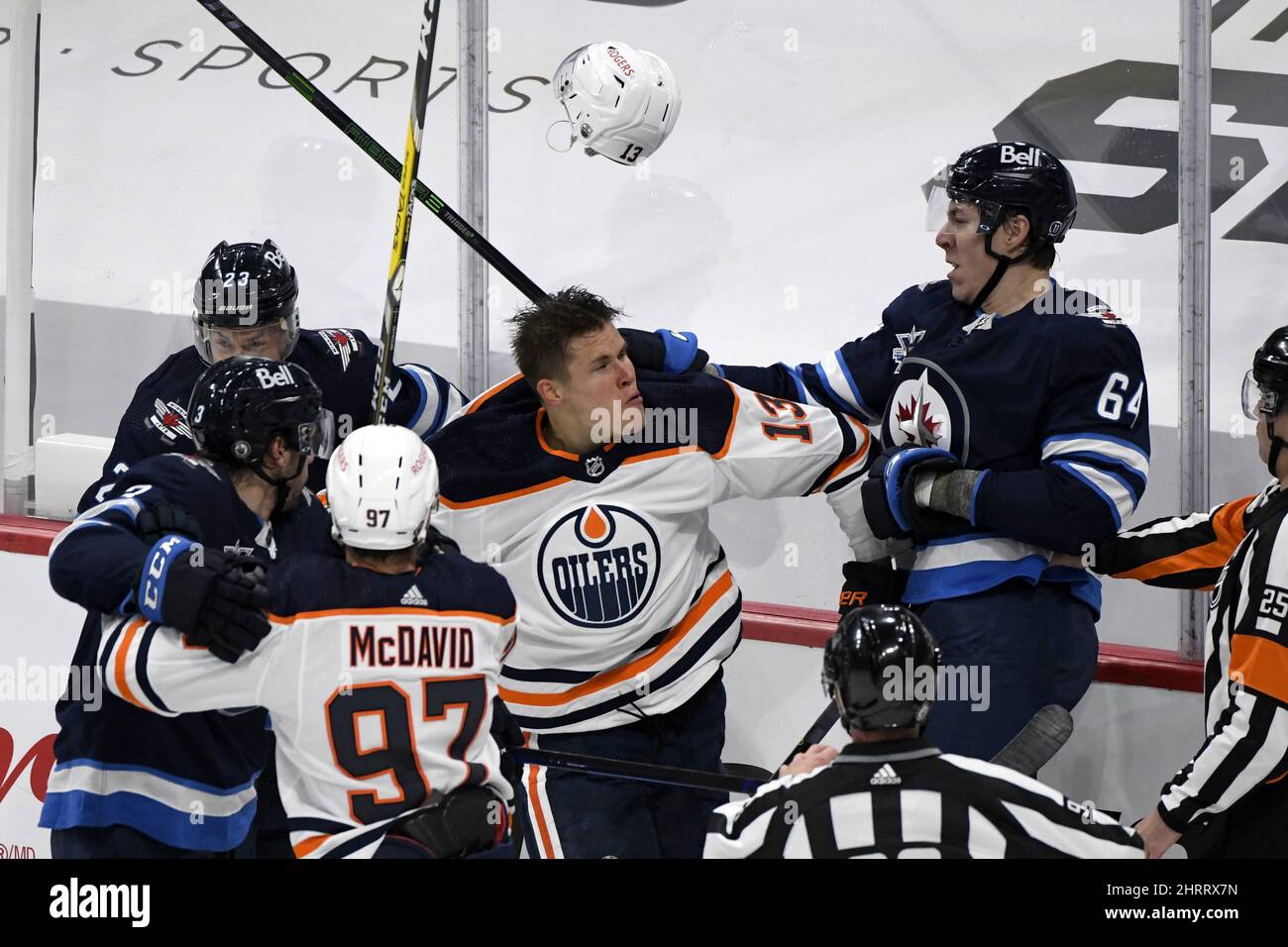 Winnipeg Jets' Logan Stanley (64) and Edmonton Oilersâ€™ Jesse ...