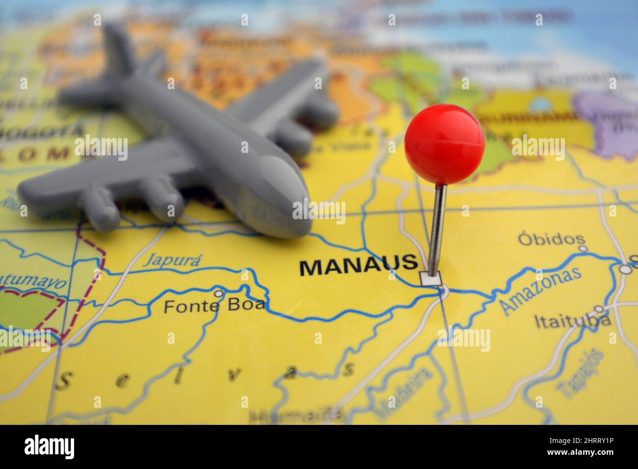 Red pin marked city of Manaus on map with a plane in Brazil Stock Photo ...