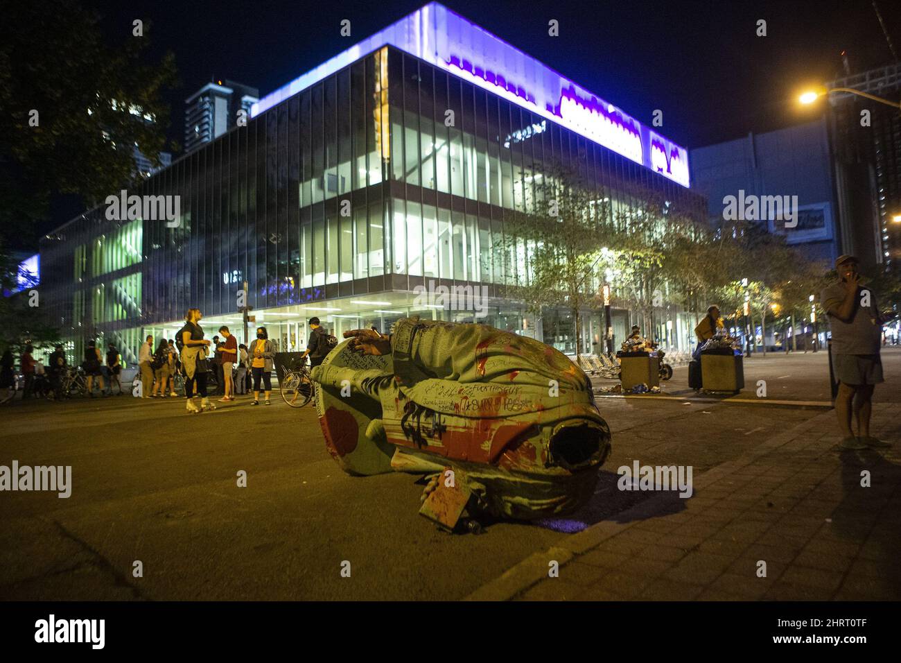 The bottom of the Egerton Ryerson statue sits on the quayside of ...