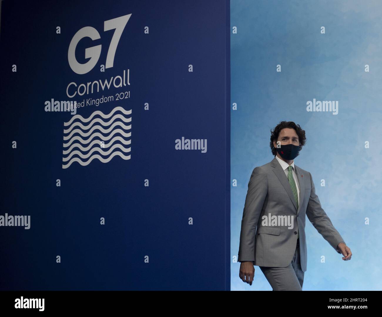 Canadian Prime Minister Justin Trudeau walks on stage at a news ...