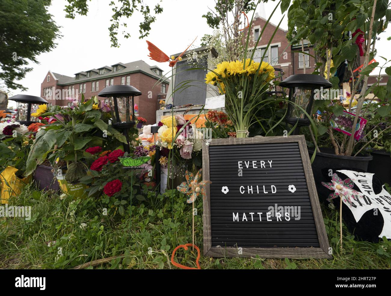 A sign is pictured at a memorial outside the Kamloops Residential ...