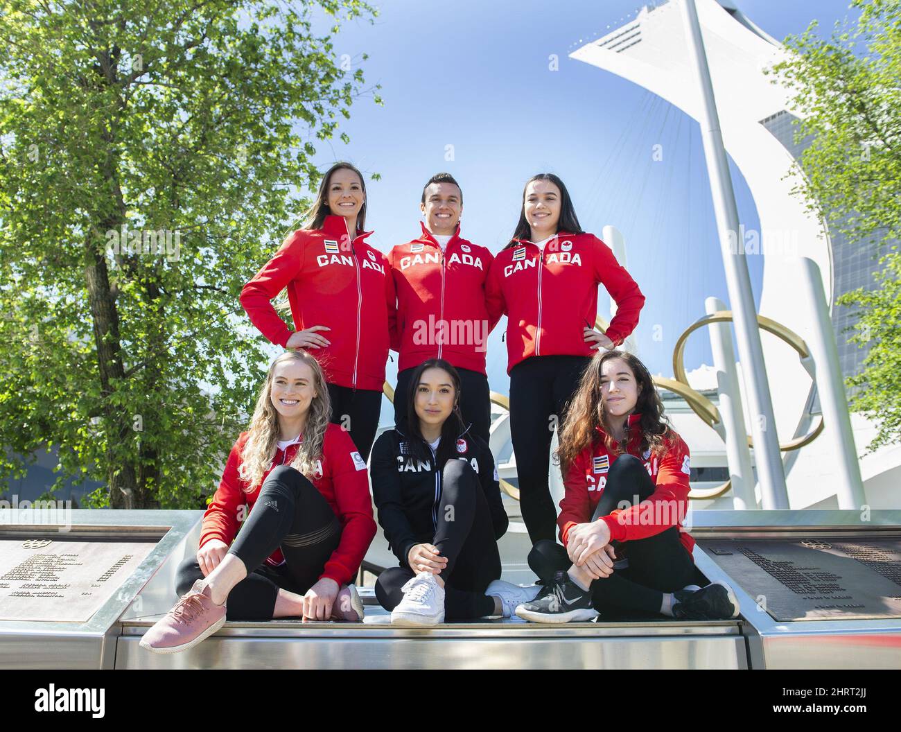 Gymnasts, front row left to right, Ellie Black, Rose Woo, Ava Stewart ...