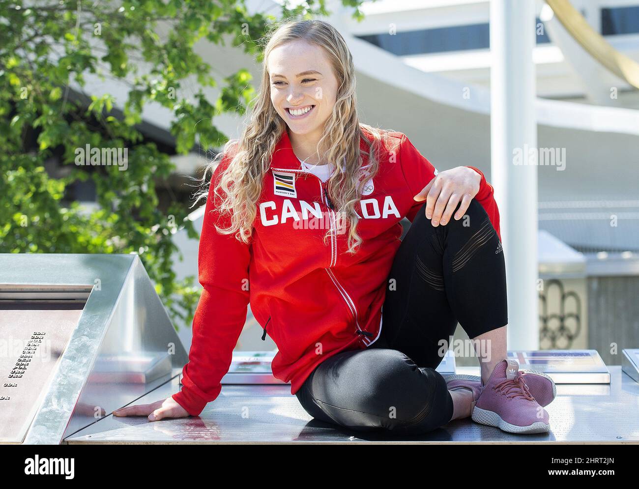 Gymnast Ellie Black smiles after receiving her official Olympic jacket ...