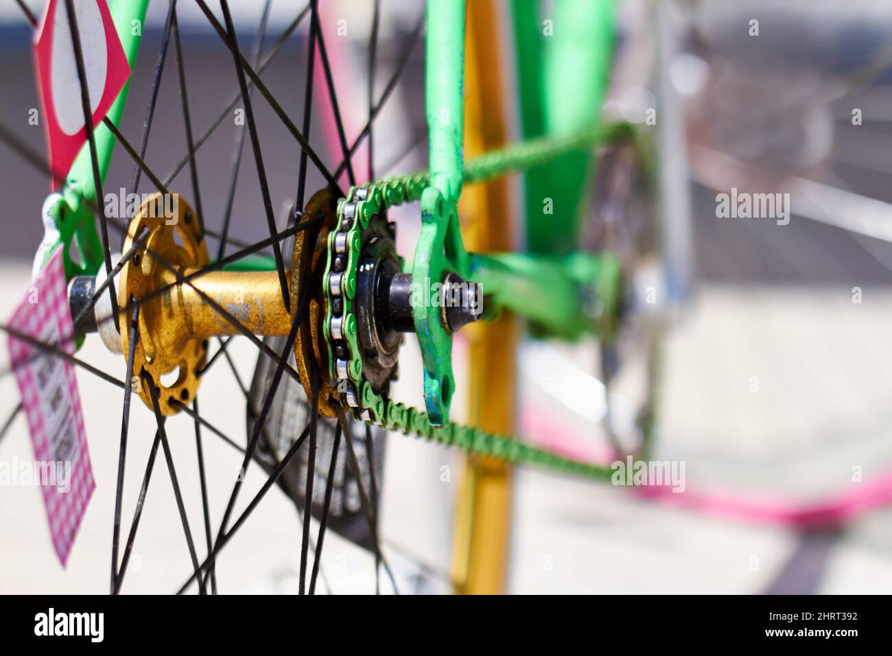 Colorful bicycle. Cropped shot a bicycle cog Stock Photo - Alamy