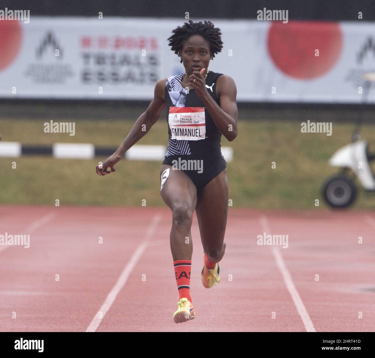Crystal Emmanuel runs toward the finish line to win the Womenâ€™s 200m ...