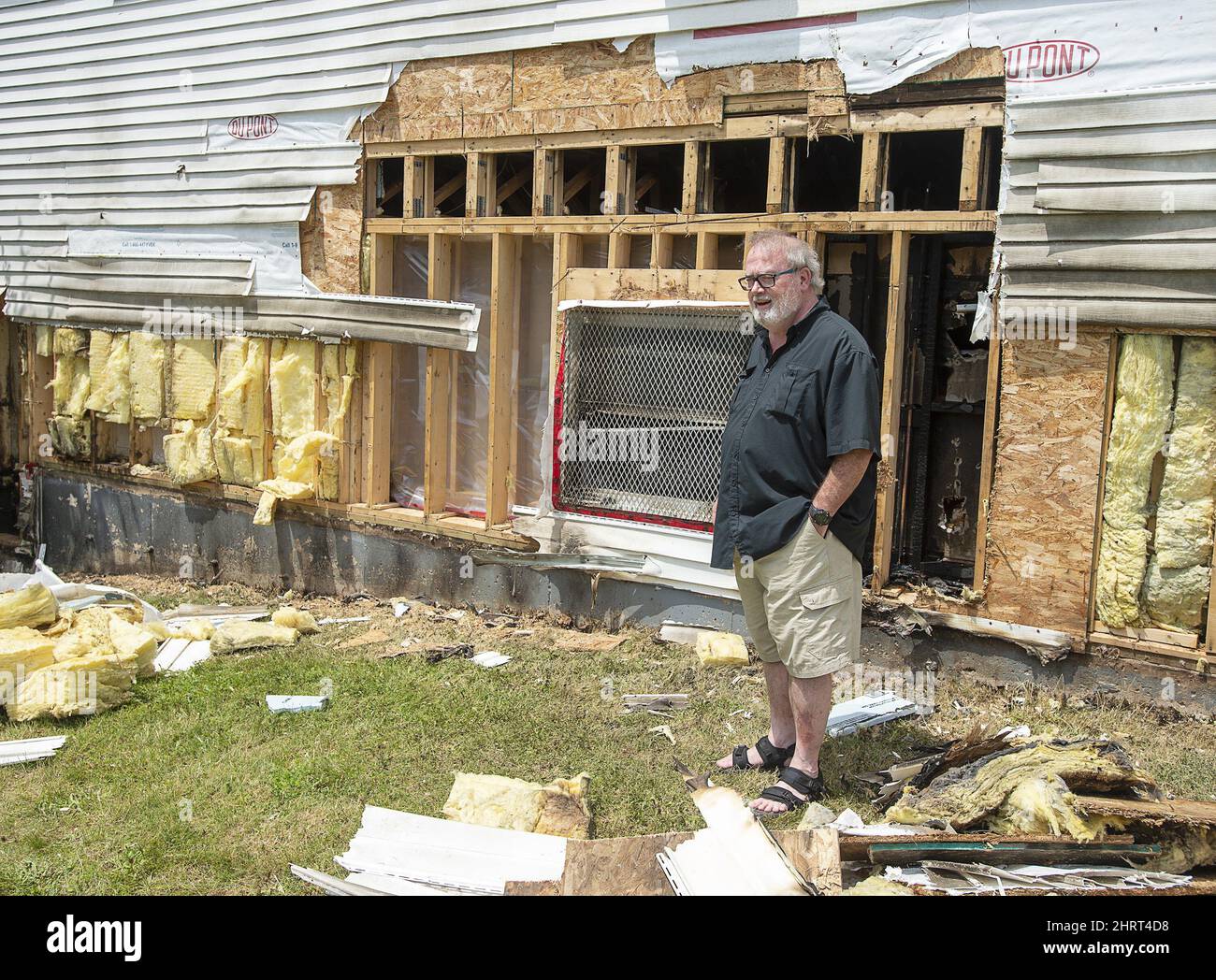 Parish priest Rev. Ron Cairns surveys the damage after a fire at St ...