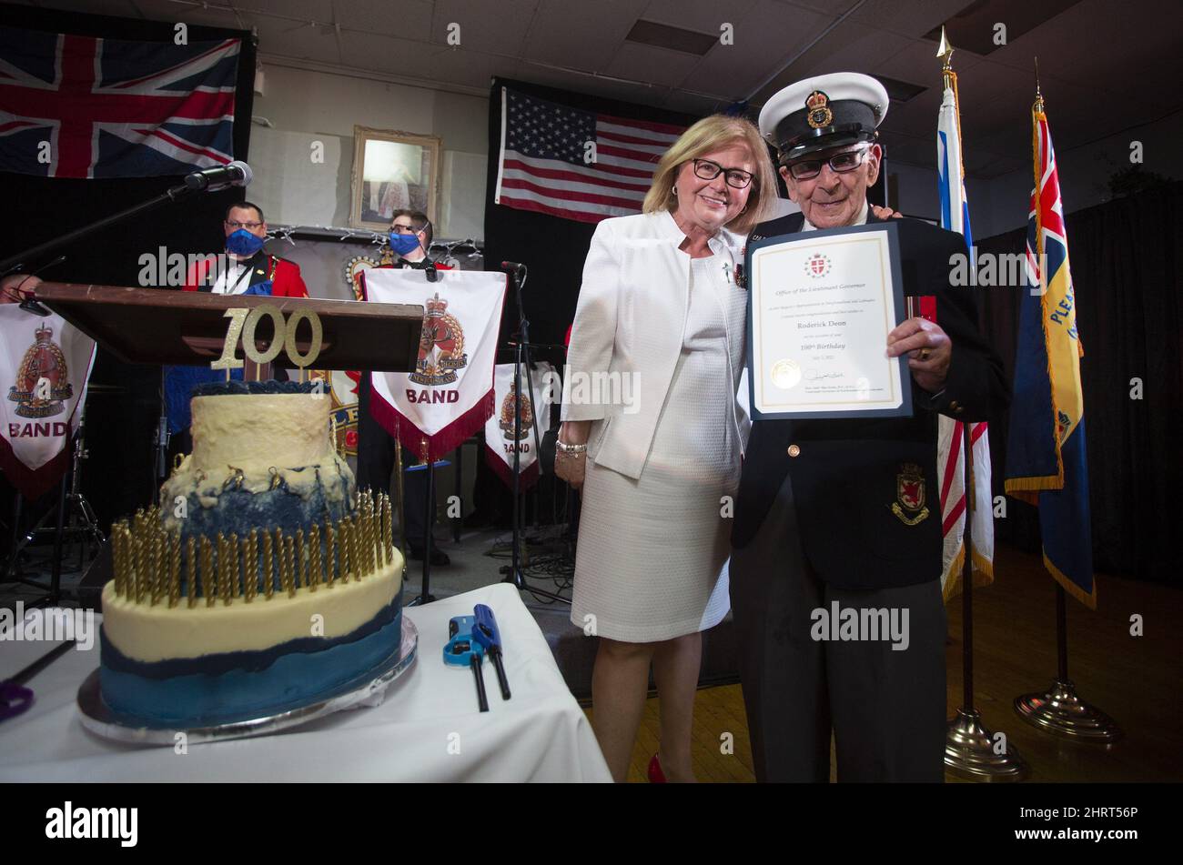 Second World War veteran Mr. Roderick Deon receives a certificate in ...