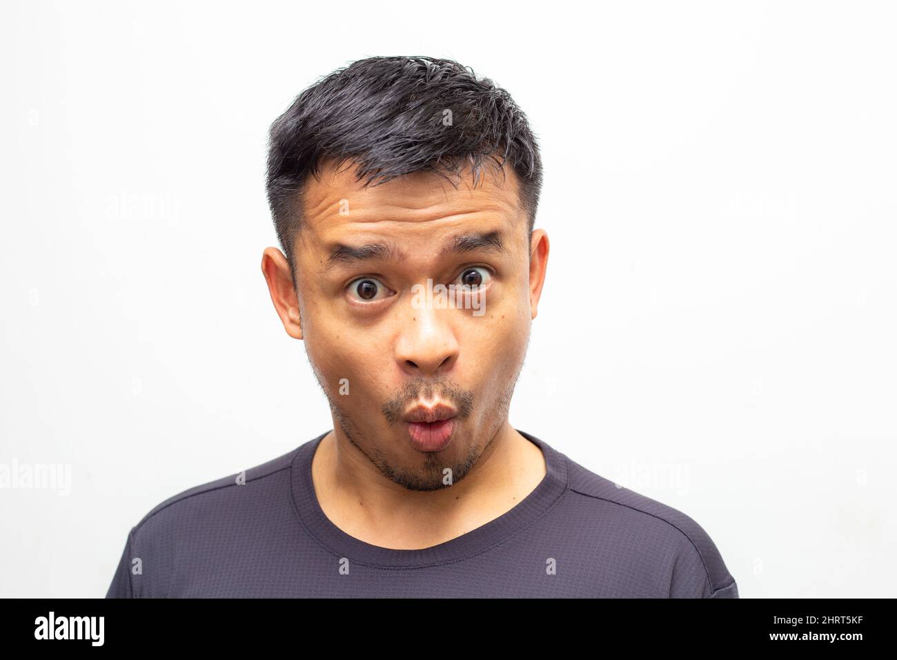 Portrait of amazing facial expression asian men face on white ...