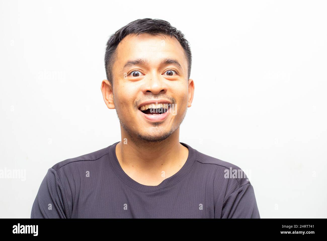 Portrait of amazing facial expression asian men face on white ...