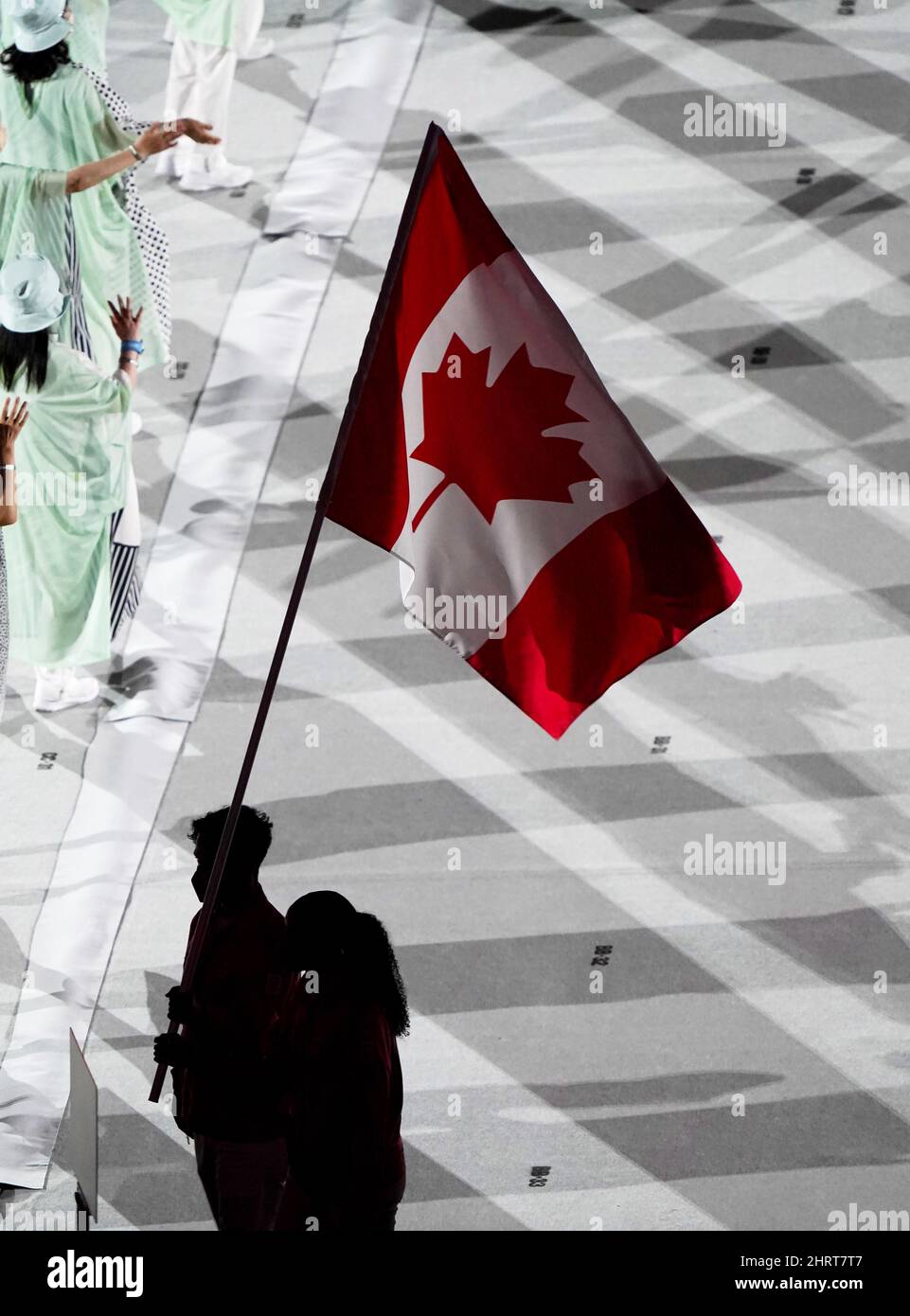 Team Canada flag-bearers Miranda Ayim and Nathan Hirayama are ...