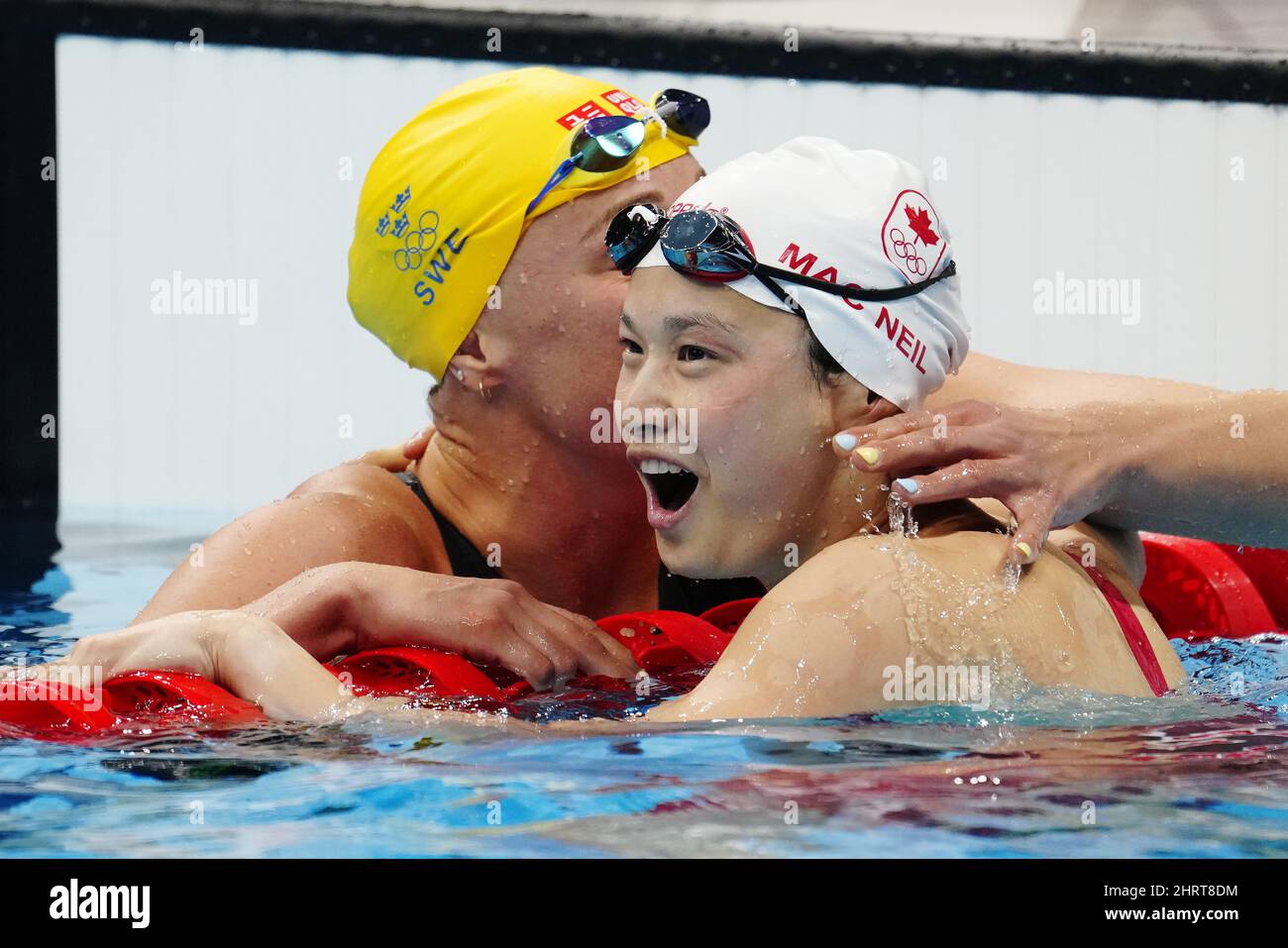 Canada's Margaret Mac Neil celebrates her gold medal swim in the women ...