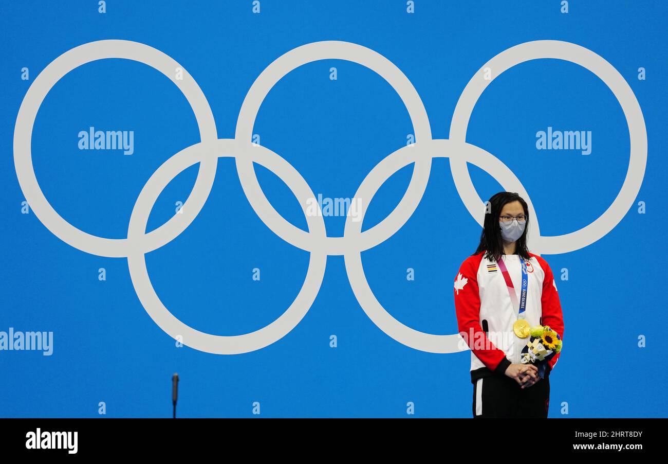 Canada's Margaret Mac Neil stands on the podium as she receives her ...