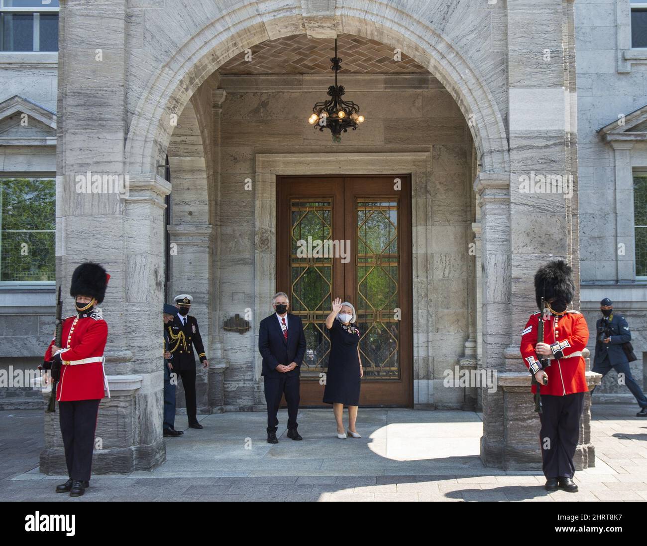 Governor General Mary Simon and her husband Whit Fraser wave before entering Rideau Hall, Monday ...