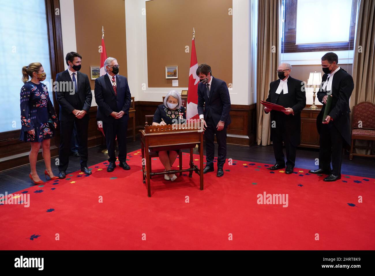 Mary Simon takes part in a signing ceremony after she took the oath to ...