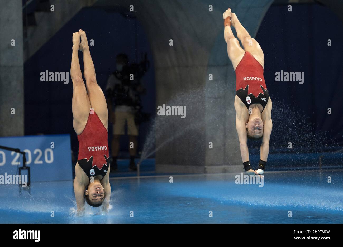 Caeli McKay (right) and Meghan Benfeito perform a dive on their way to ...