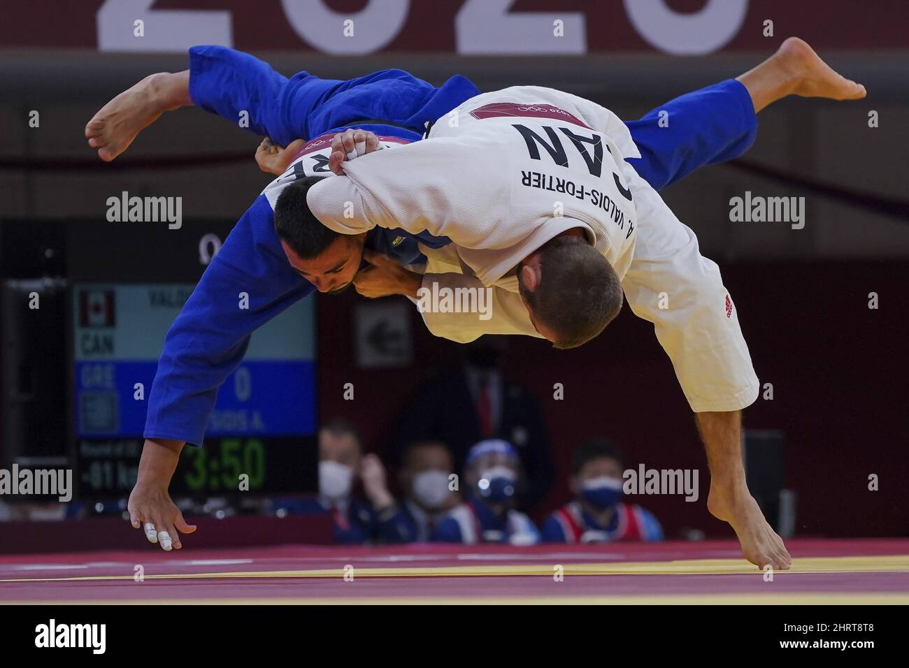 Antoine Valois-Fortier, right, of Canada competes against Alexios ...