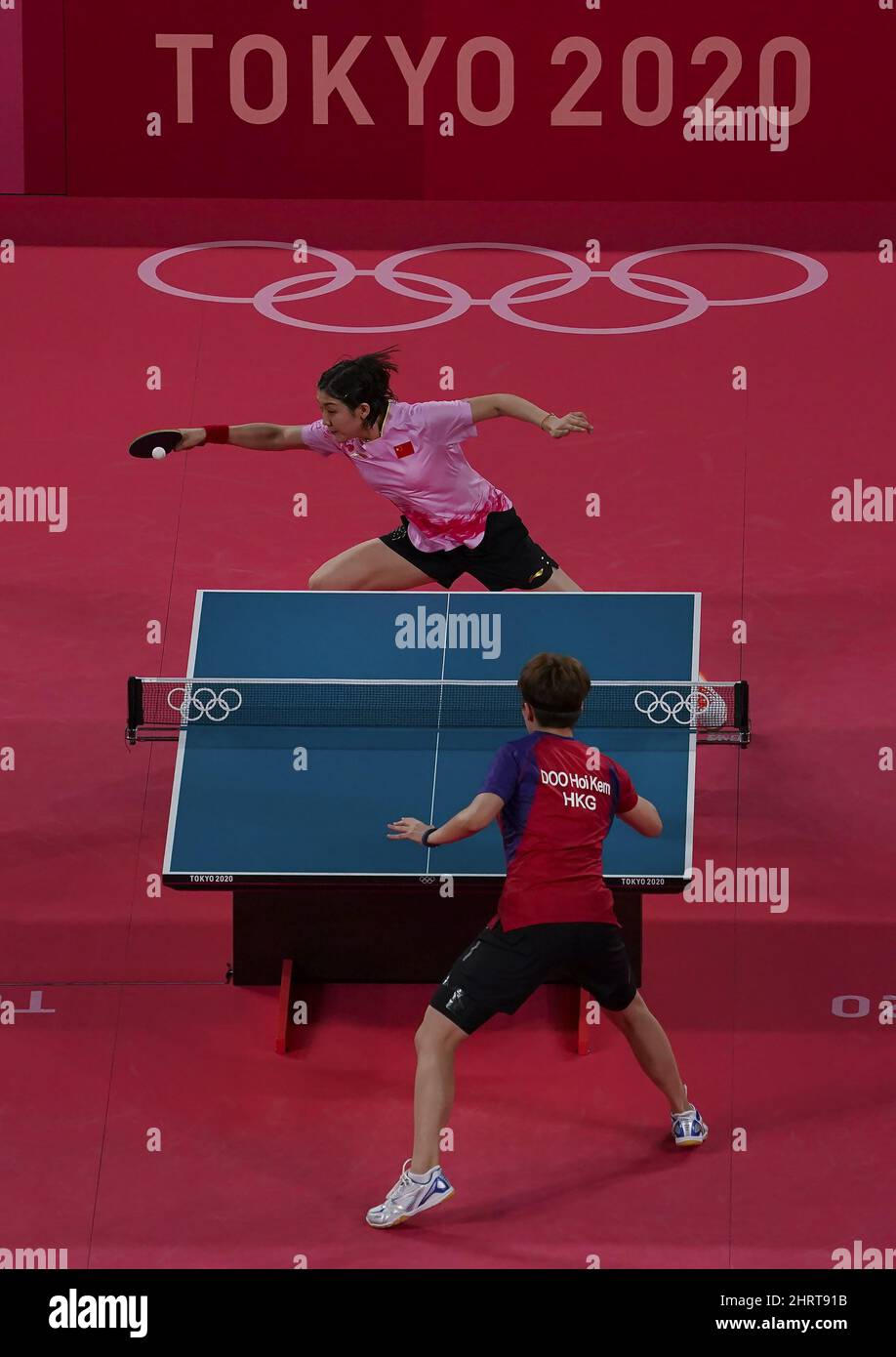 China's Chen Meng, top, and Doo Hoi-kem, of Hong Kong, compete in ...