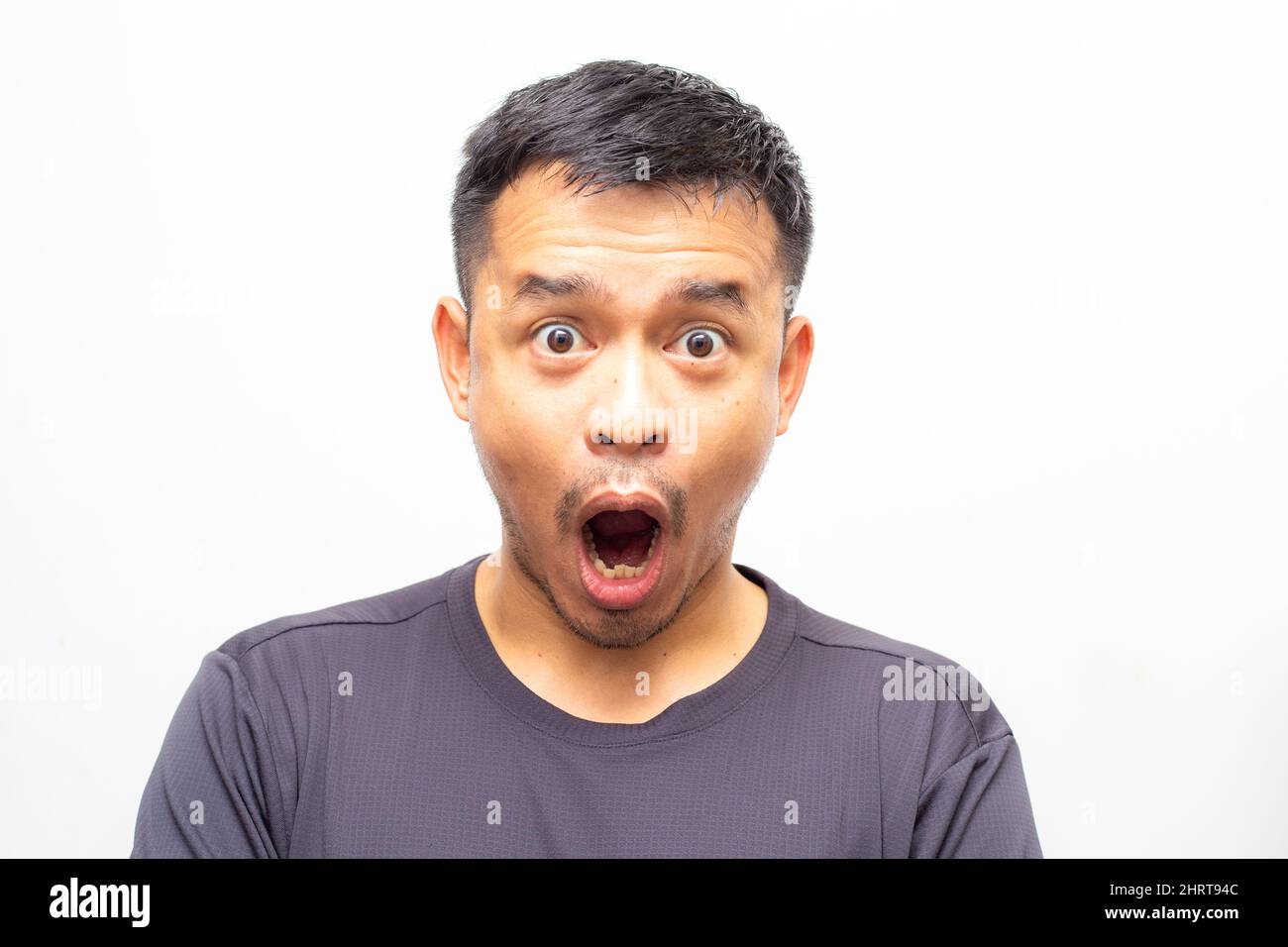 Portrait of amazing facial expression asian men face on white ...