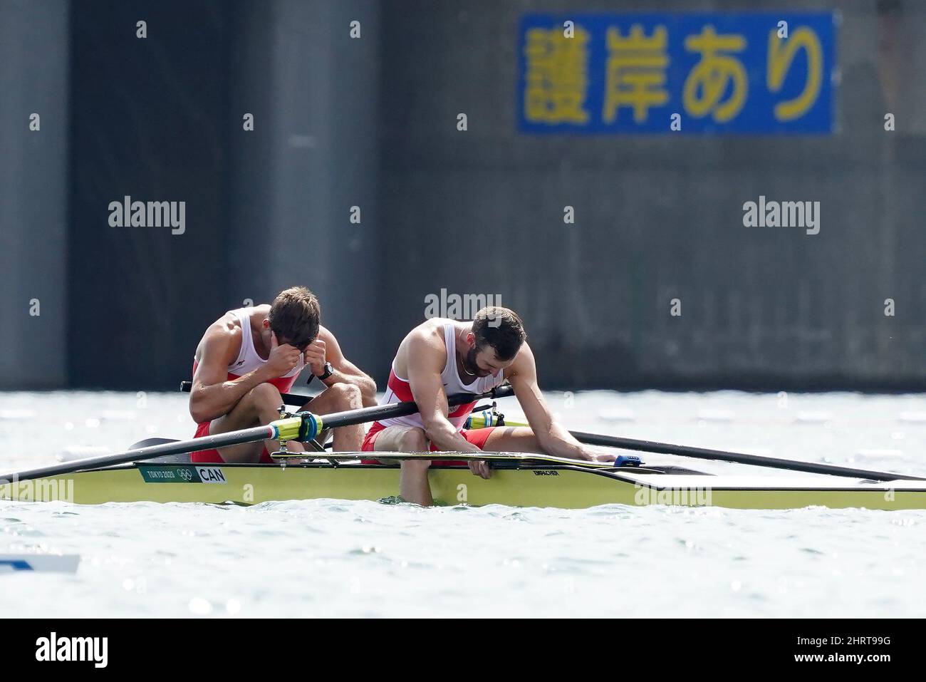 Canada's Kai Langerfeld and Conlin McCabe react after competing in the ...