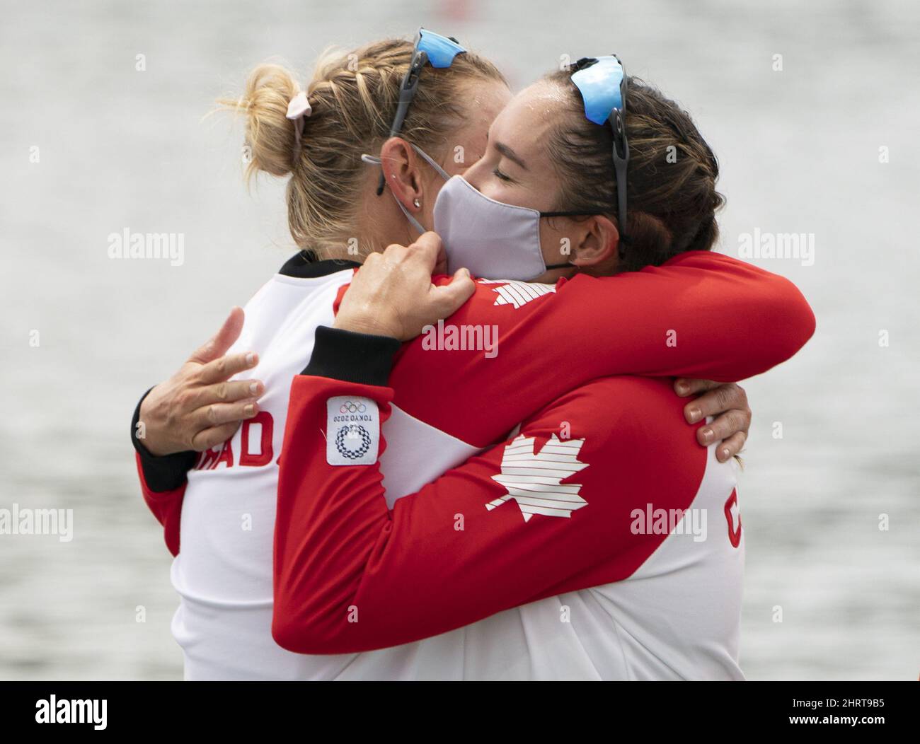 Canadaâ€™s Christine Roper and Andrea Proske hug as they wait on the ...