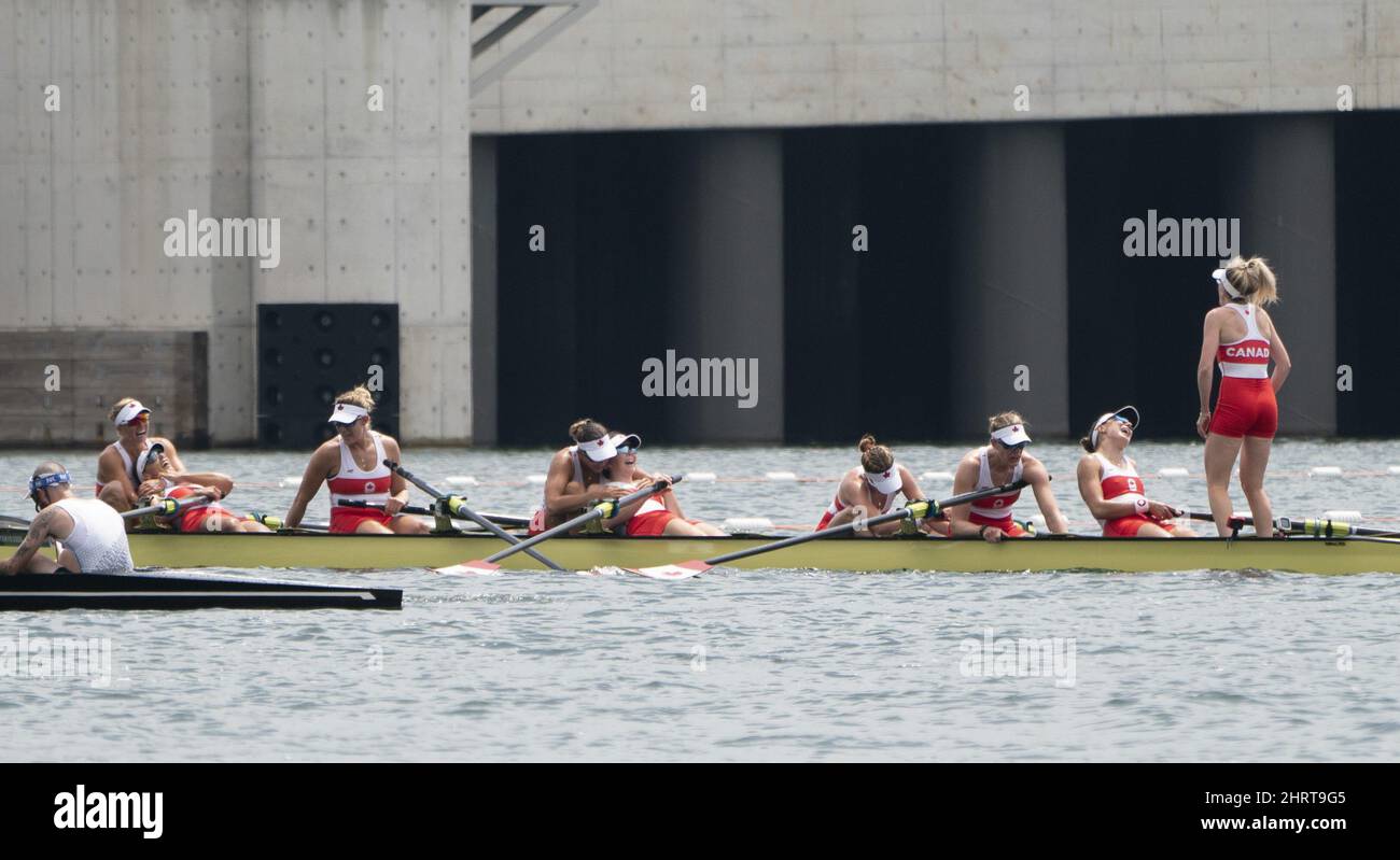 Canadaâ€™s Kristen Kit stands in the boat as they react after crossing ...