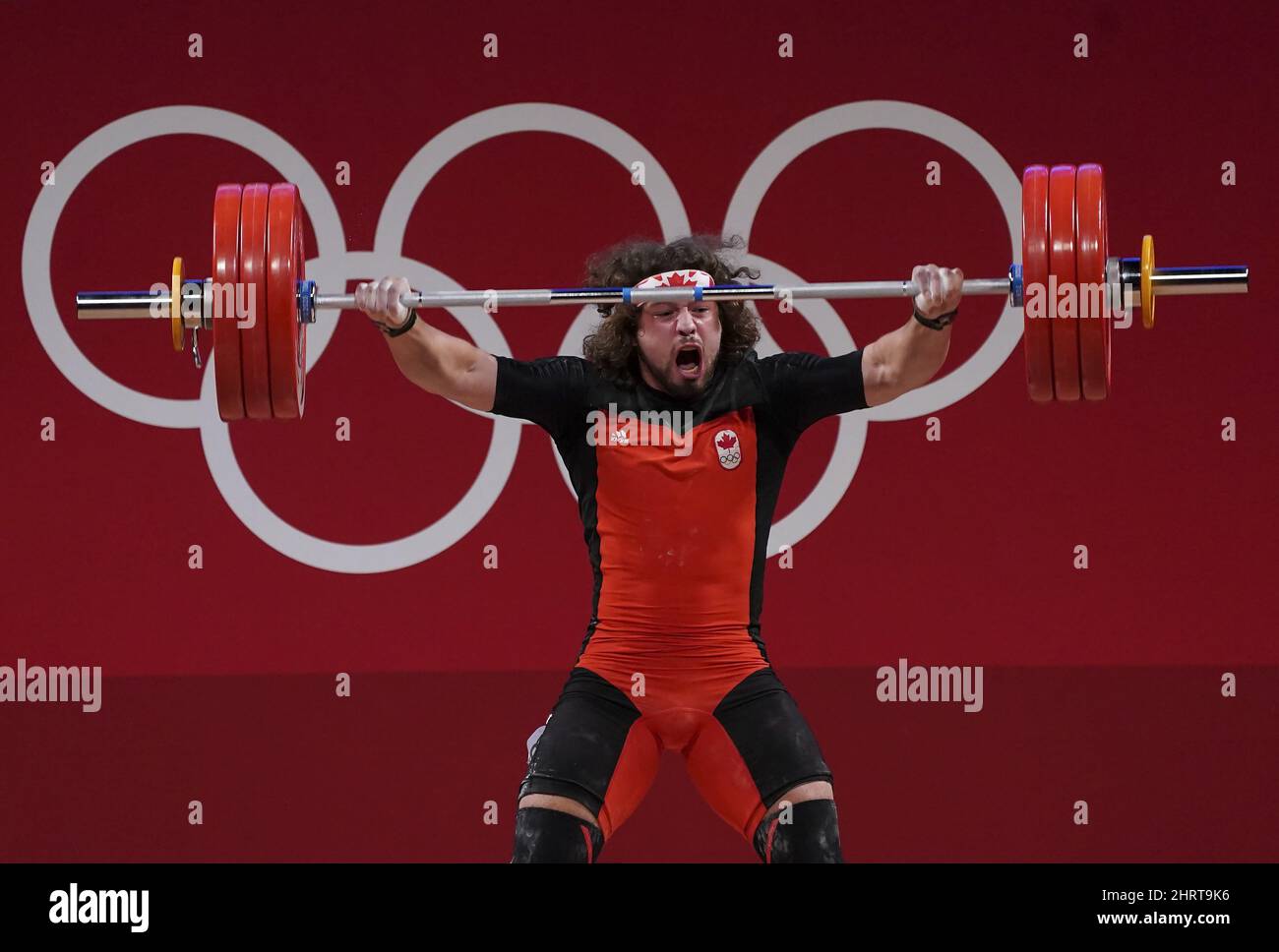 Canada's Boady Santavy competes in the Menâ€™s 96kg Weightlifting ...
