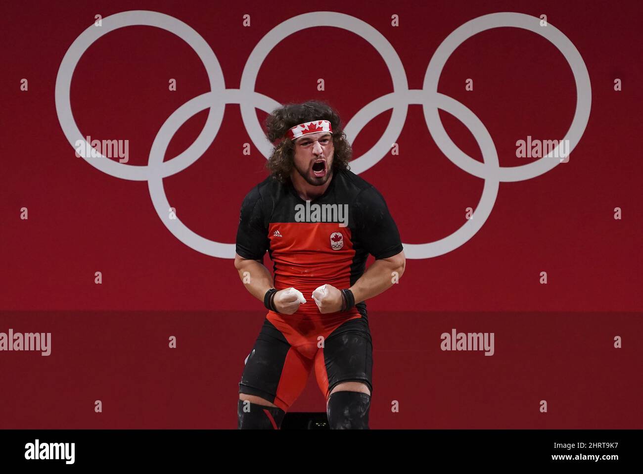 Canada's Boady Santavy competes in the Menâ€™s 96kg Weightlifting ...