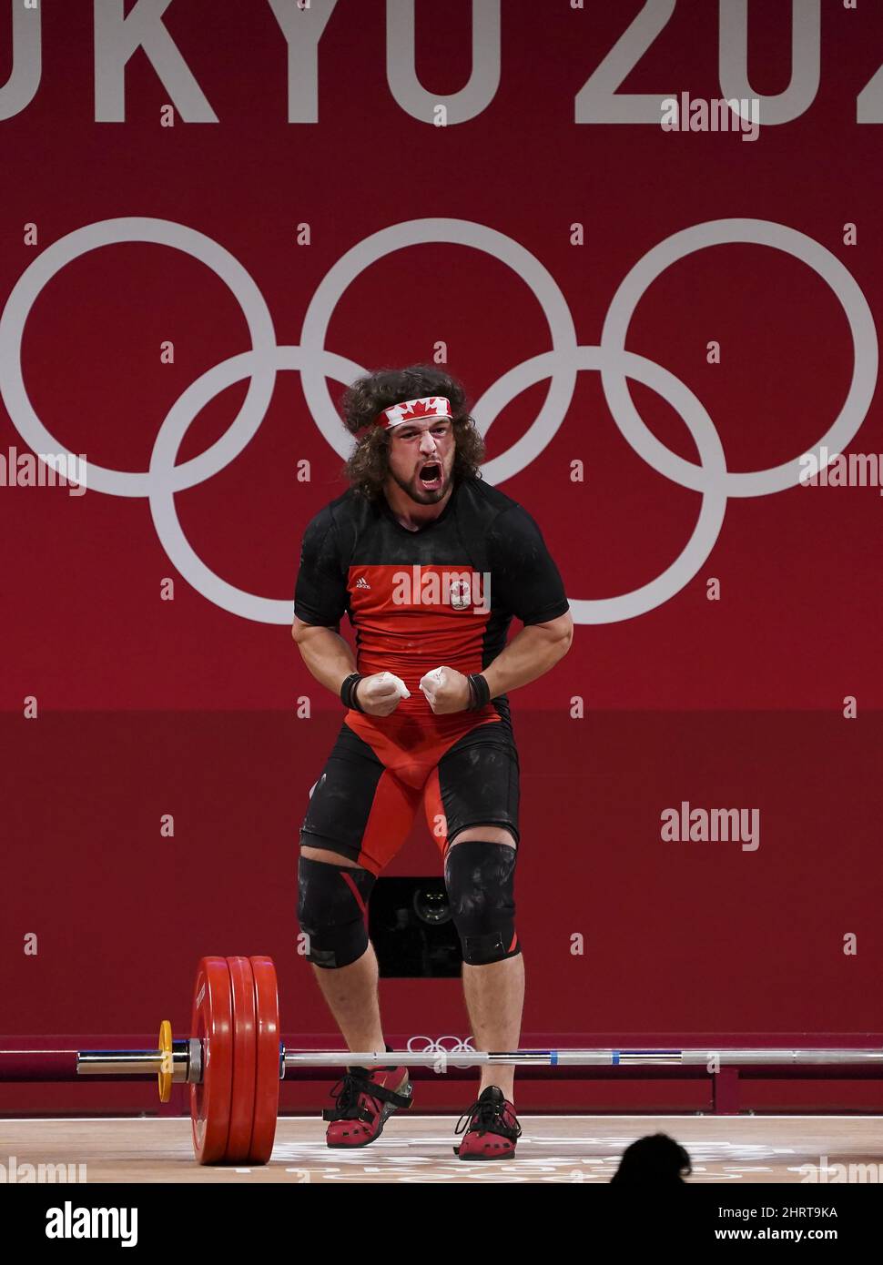 Canada's Boady Santavy competes in the Menâ€™s 96kg Weightlifting ...