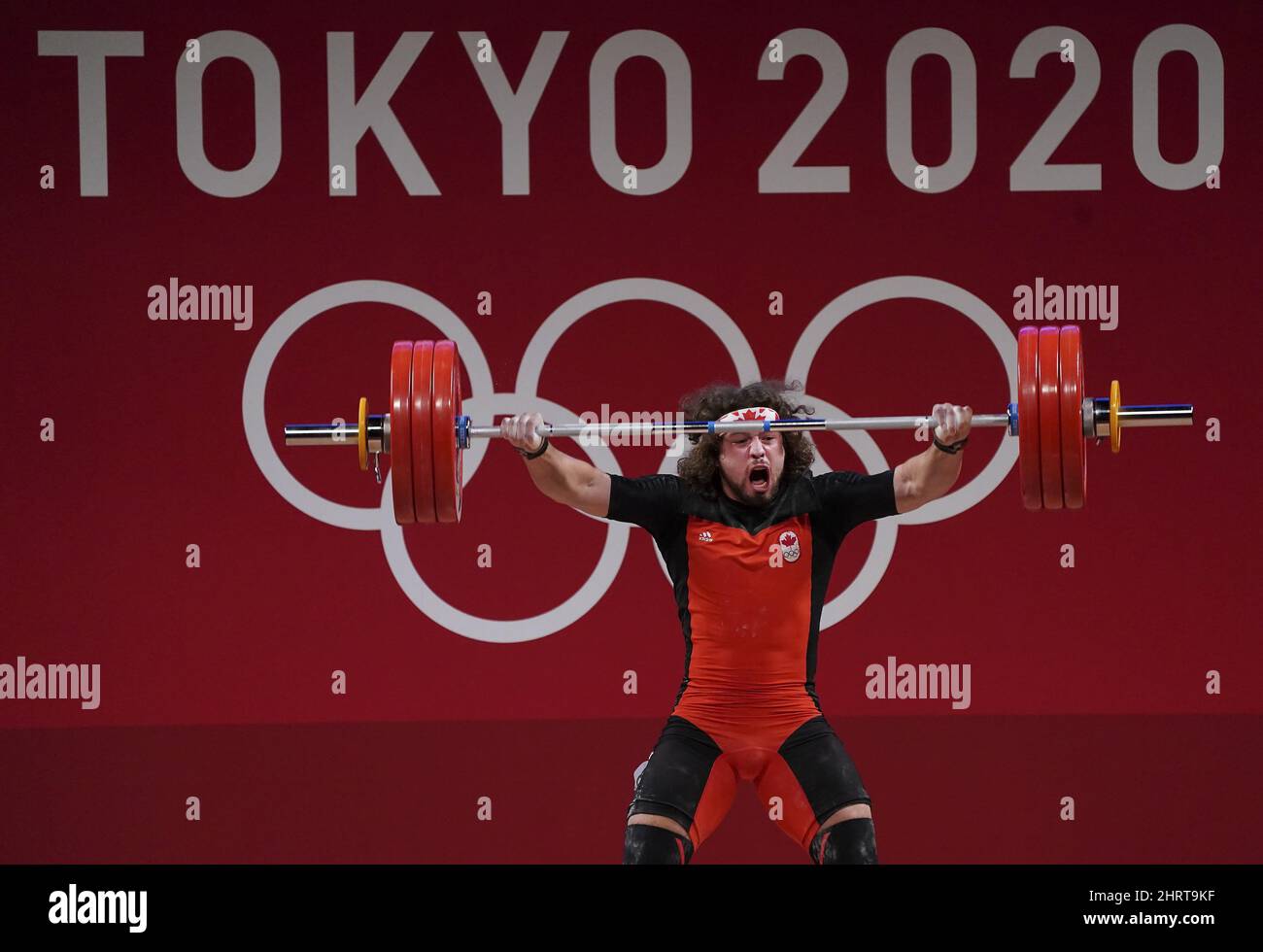 Canada's Boady Santavy competes in the Menâ€™s 96kg Weightlifting ...