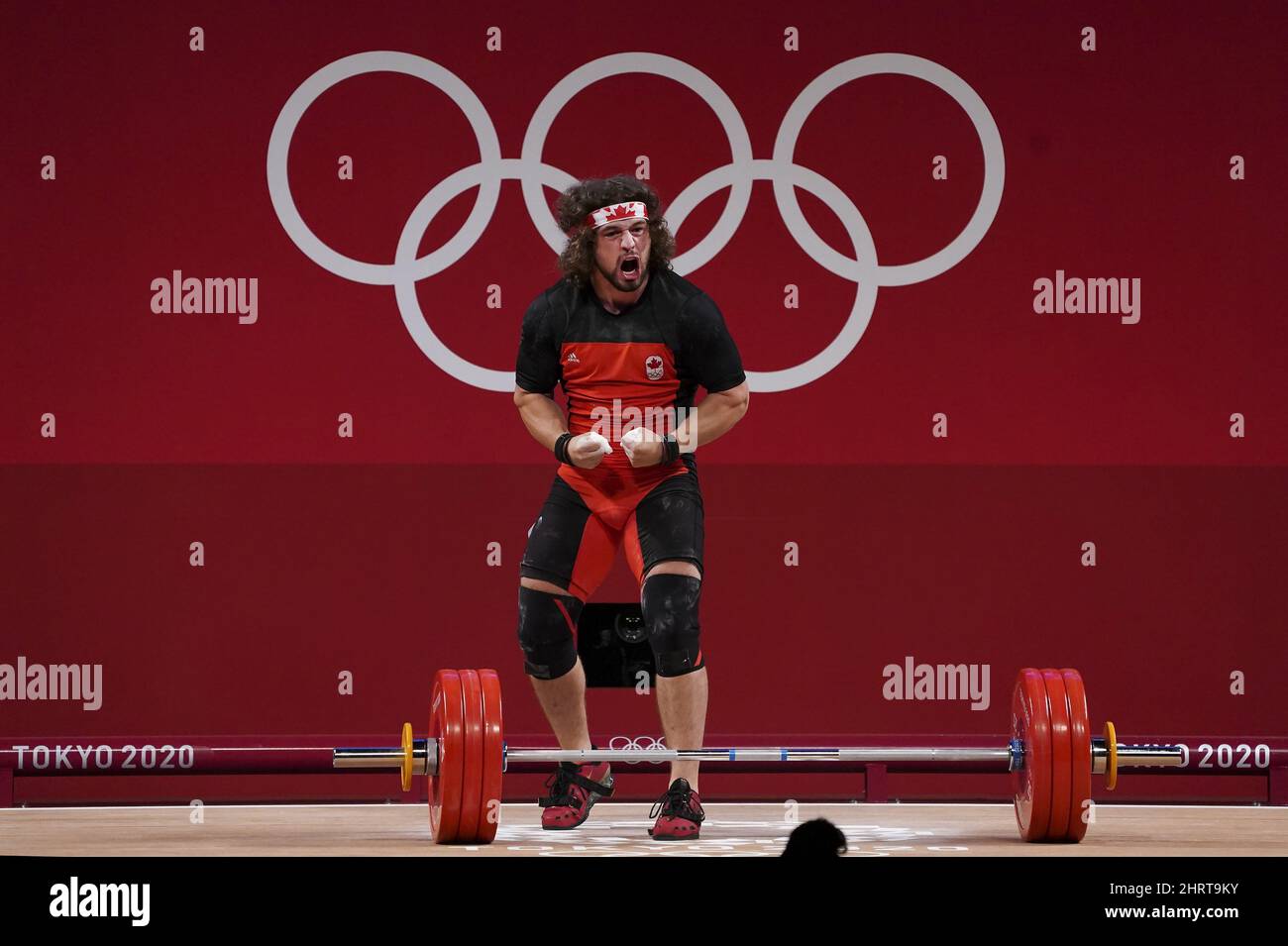 Canada's Boady Santavy competes in the Menâ€™s 96kg Weightlifting ...