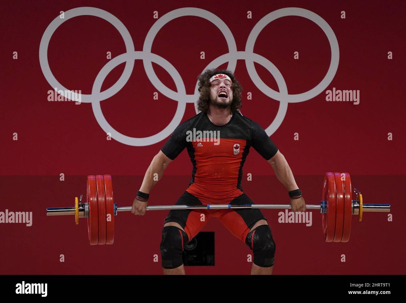 Canada's Boady Santavy competes in the Menâ€™s 96kg Weightlifting ...